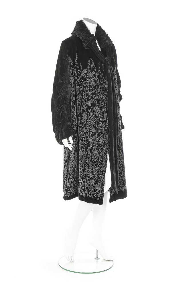 Lot 125 - A Liberty of London black velvet opera coat,