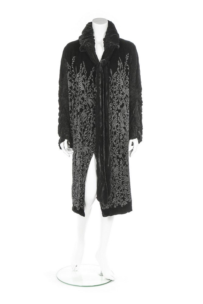 Lot 125 - A Liberty of London black velvet opera coat,