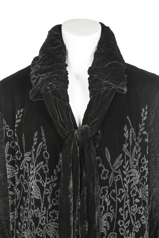Lot 125 - A Liberty of London black velvet opera coat,