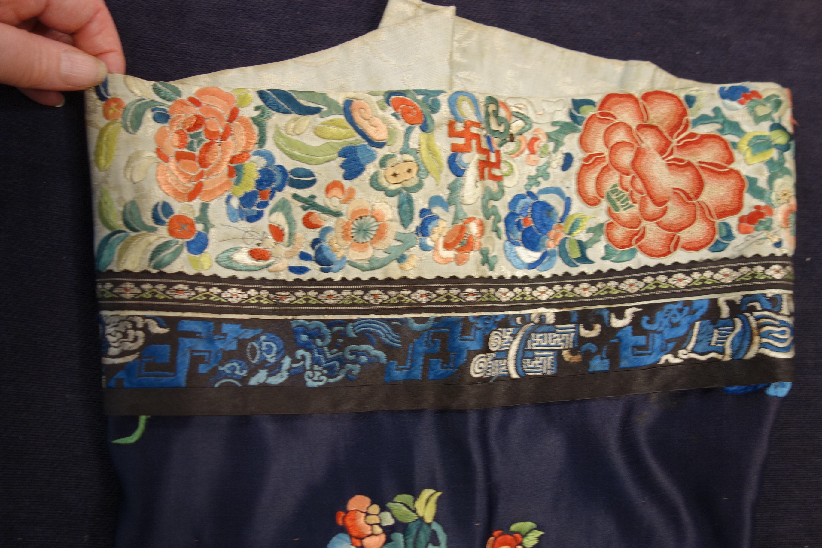 Lot 262 - An embroidered satin informal robe, Changfu,