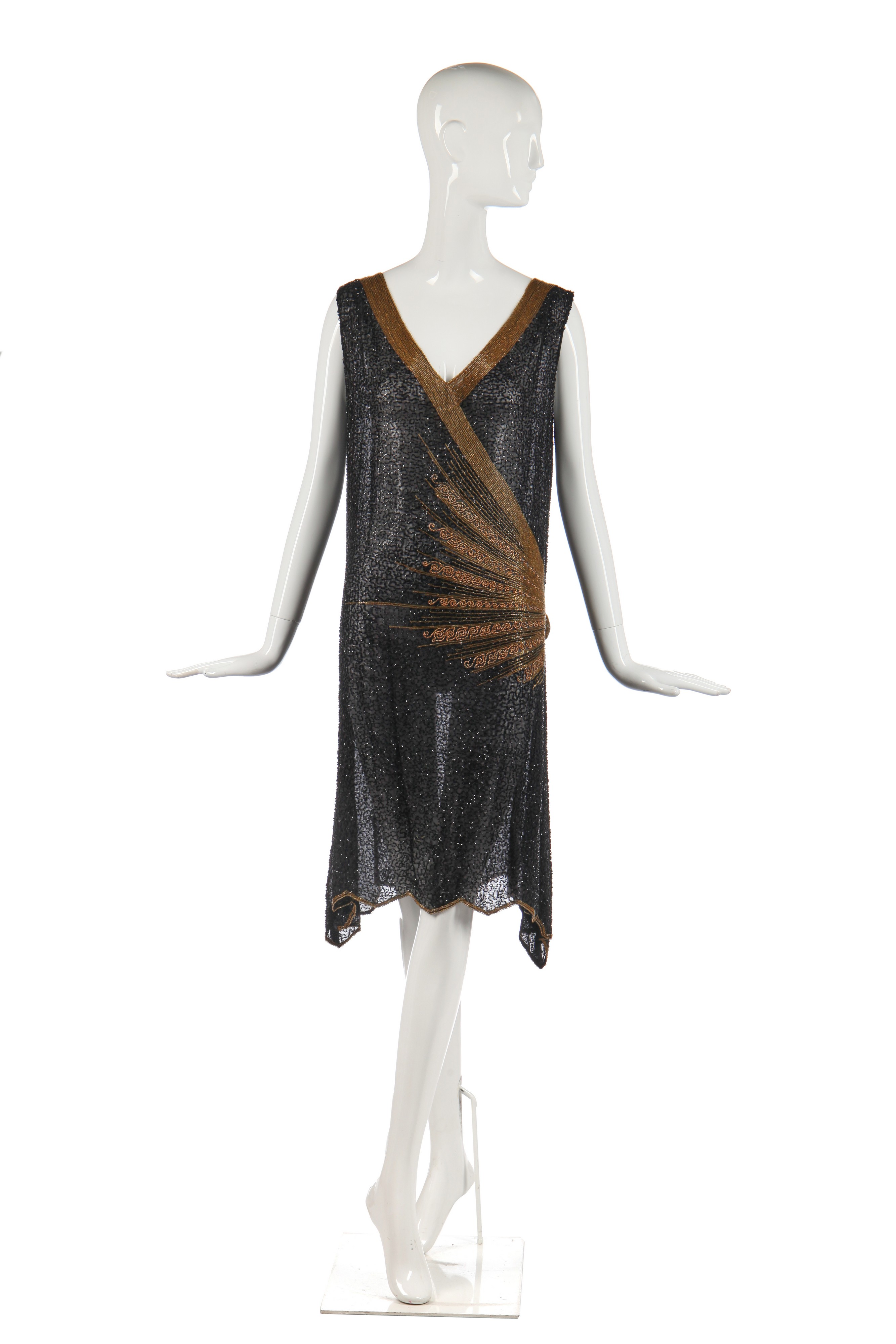 Lot 244 - A black and gold beaded flapper dress,