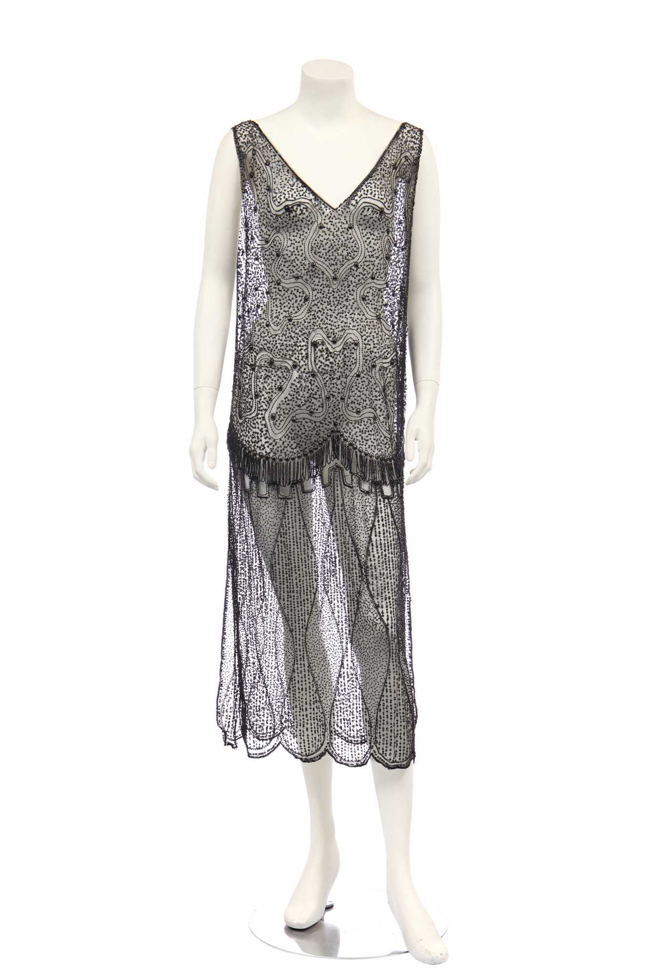 Lot 397 - A sequined and beaded black tulle tabard,