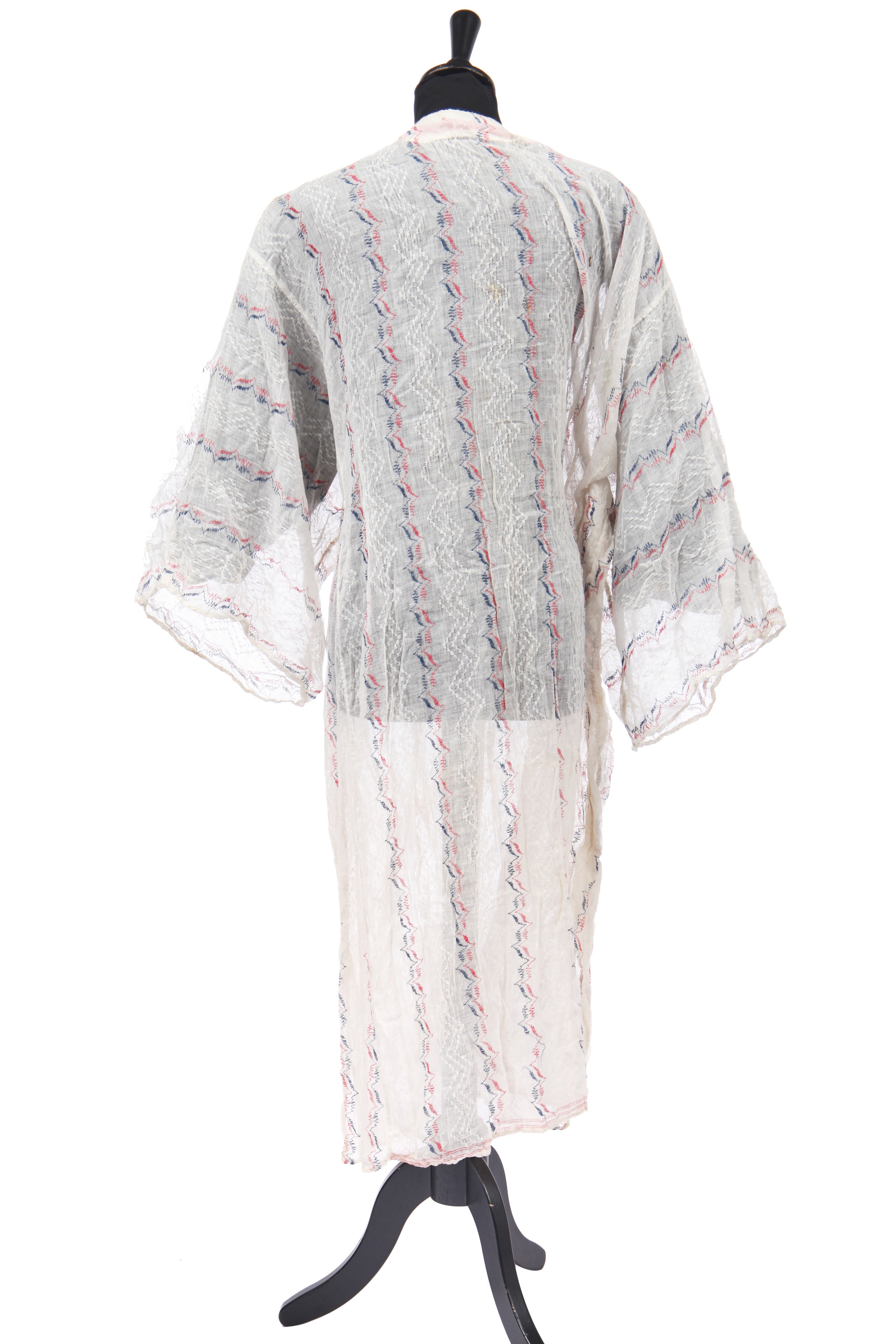 Lot 483 - A woven muslin robe and accessories,