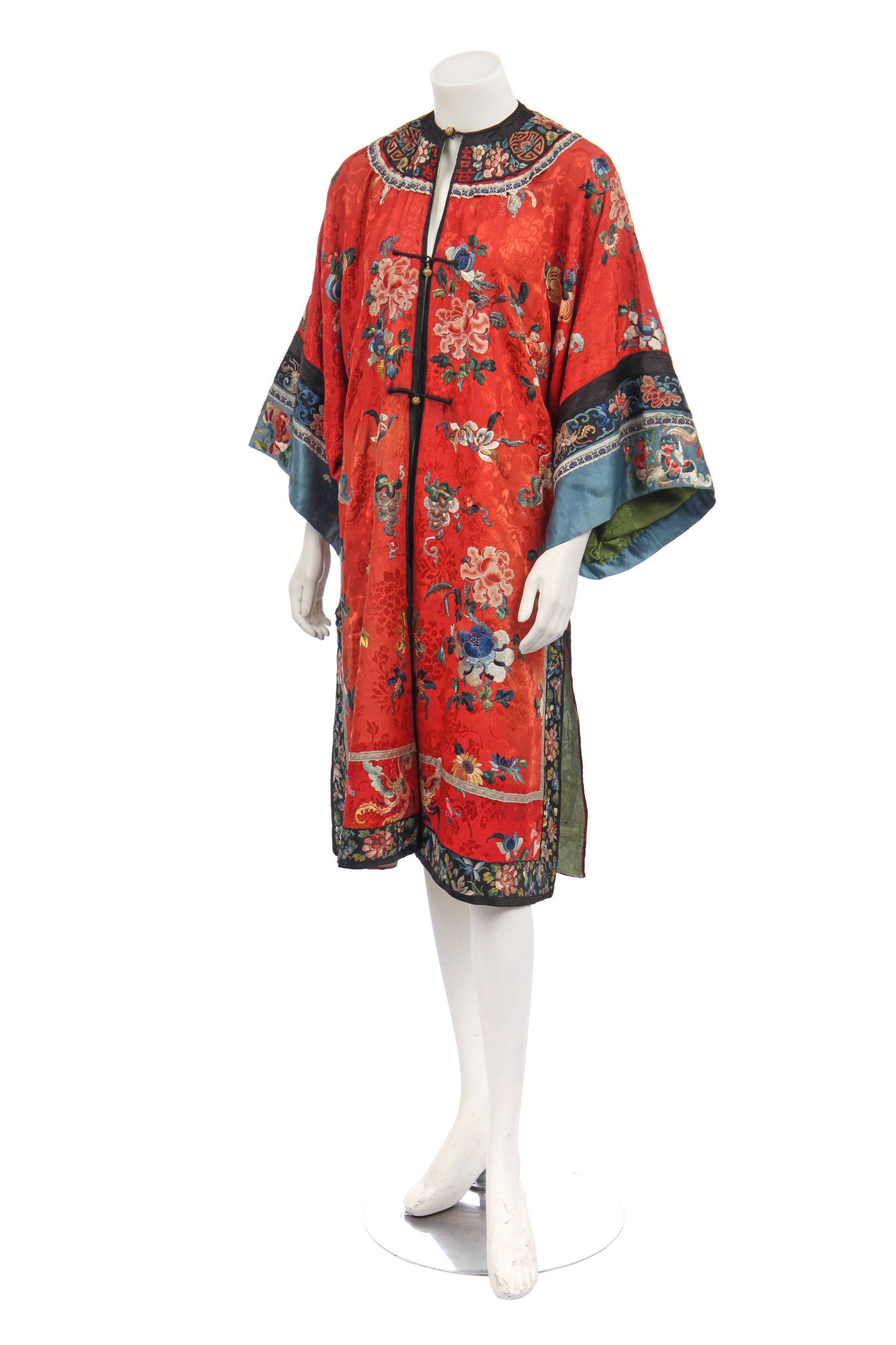 Lot 492 - An embroidered red damask silk chang-fu,