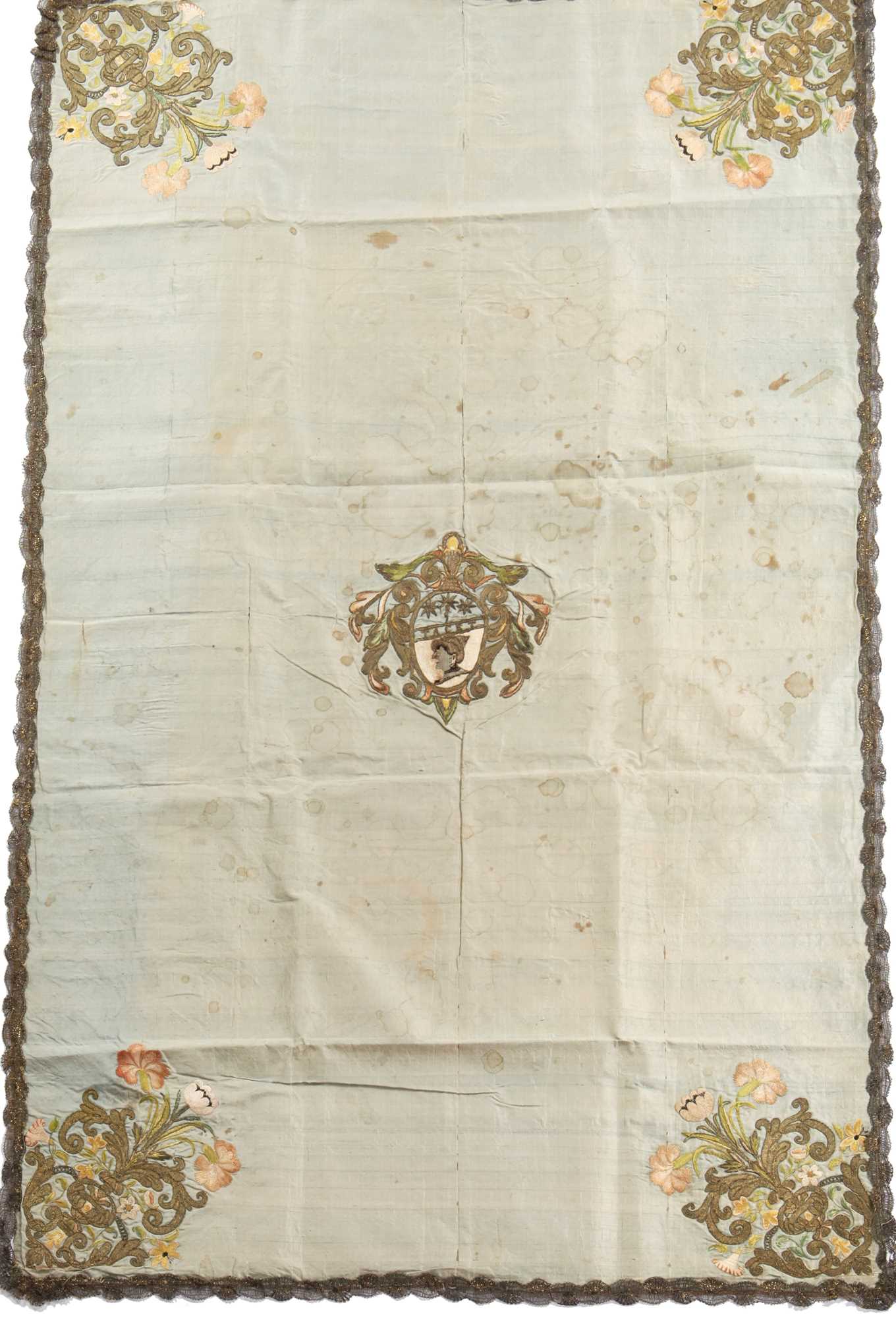 Lot 491 - An embroidered heraldic bearing cloth, cover,