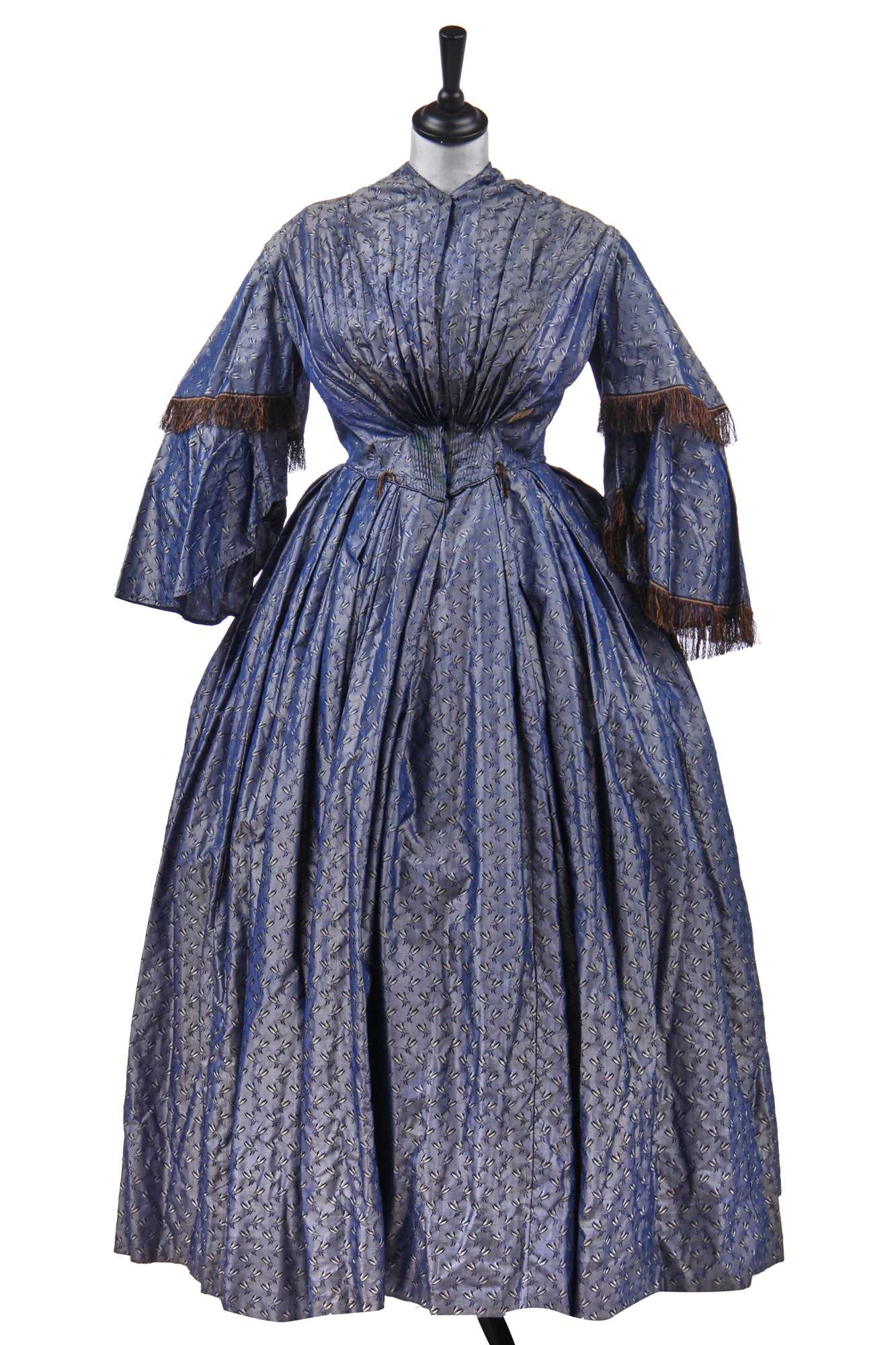 Lot 517 - A changeant-silk brocaded dress, circa 1855