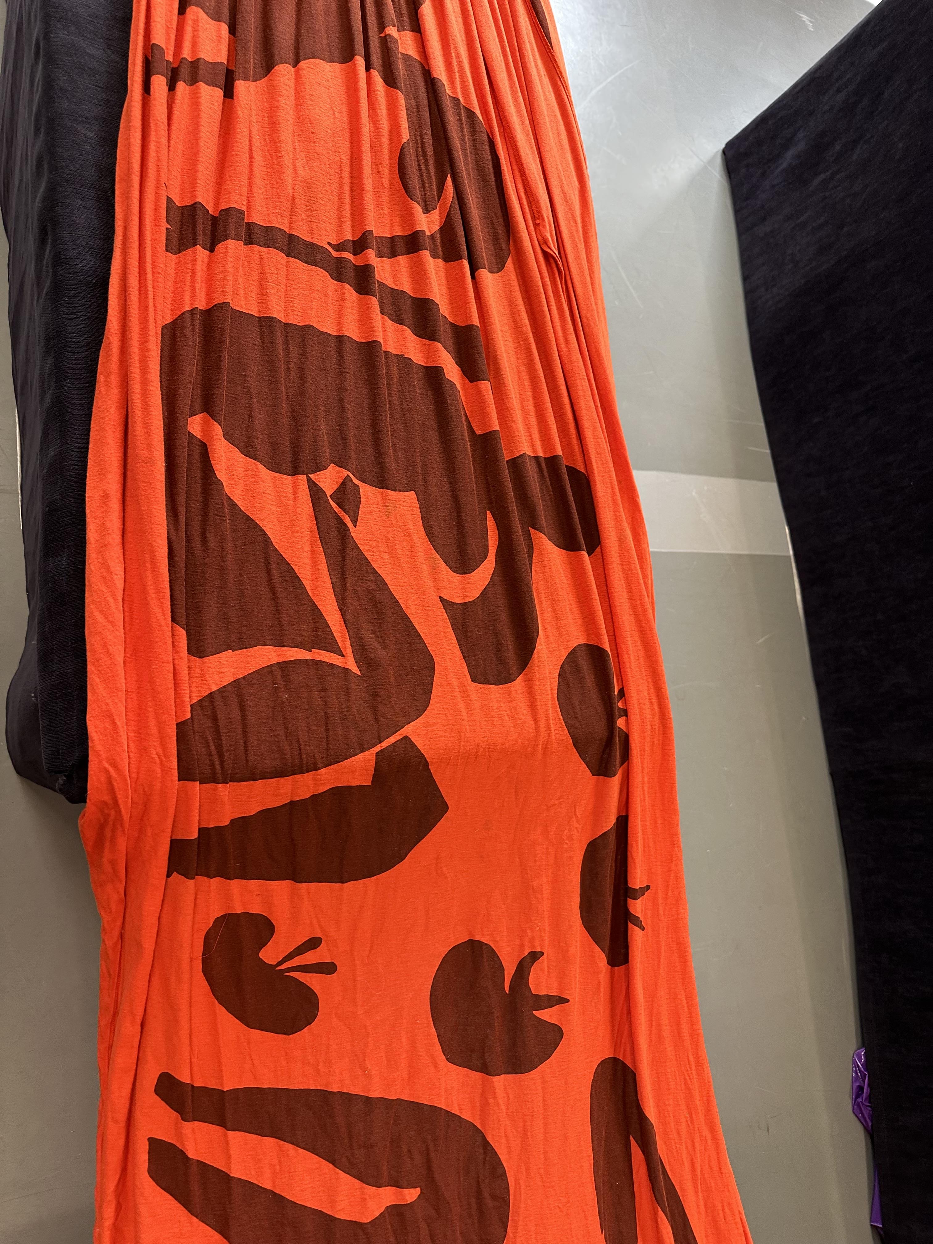 Lot 13 - A Westwood/McLaren orange toga dress and bra,