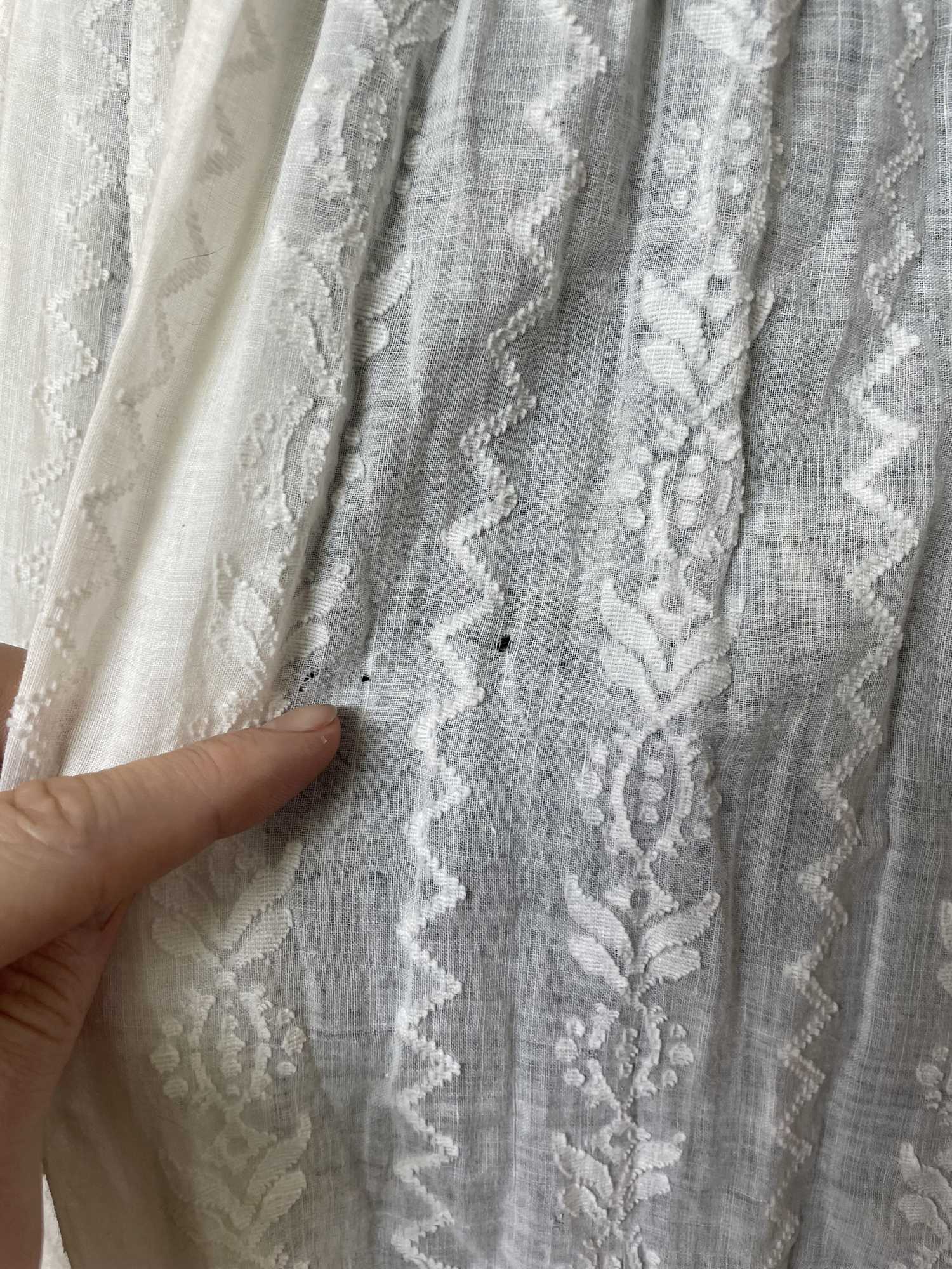 Lot 212 - A rare woven muslin round gown, circa 1795,