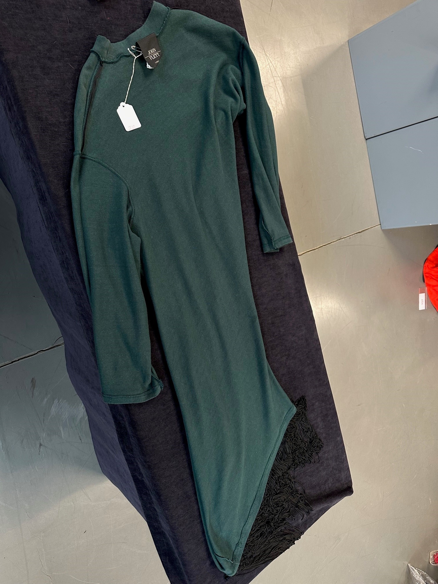 Lot 210 - A John Flett green jersey cotton dress,