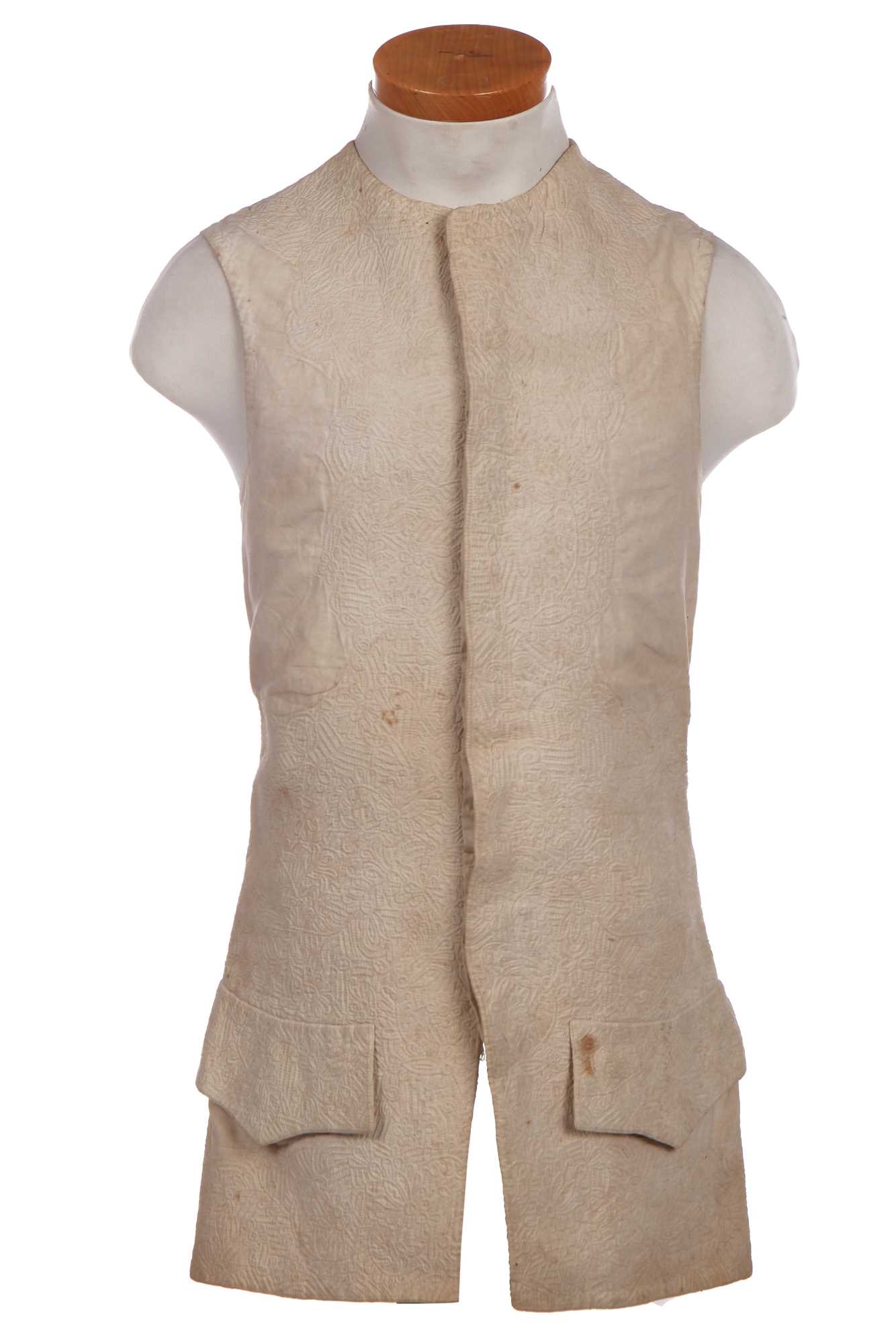Lot 213 - A gentleman's quilted linen waistcoat, 1730s,