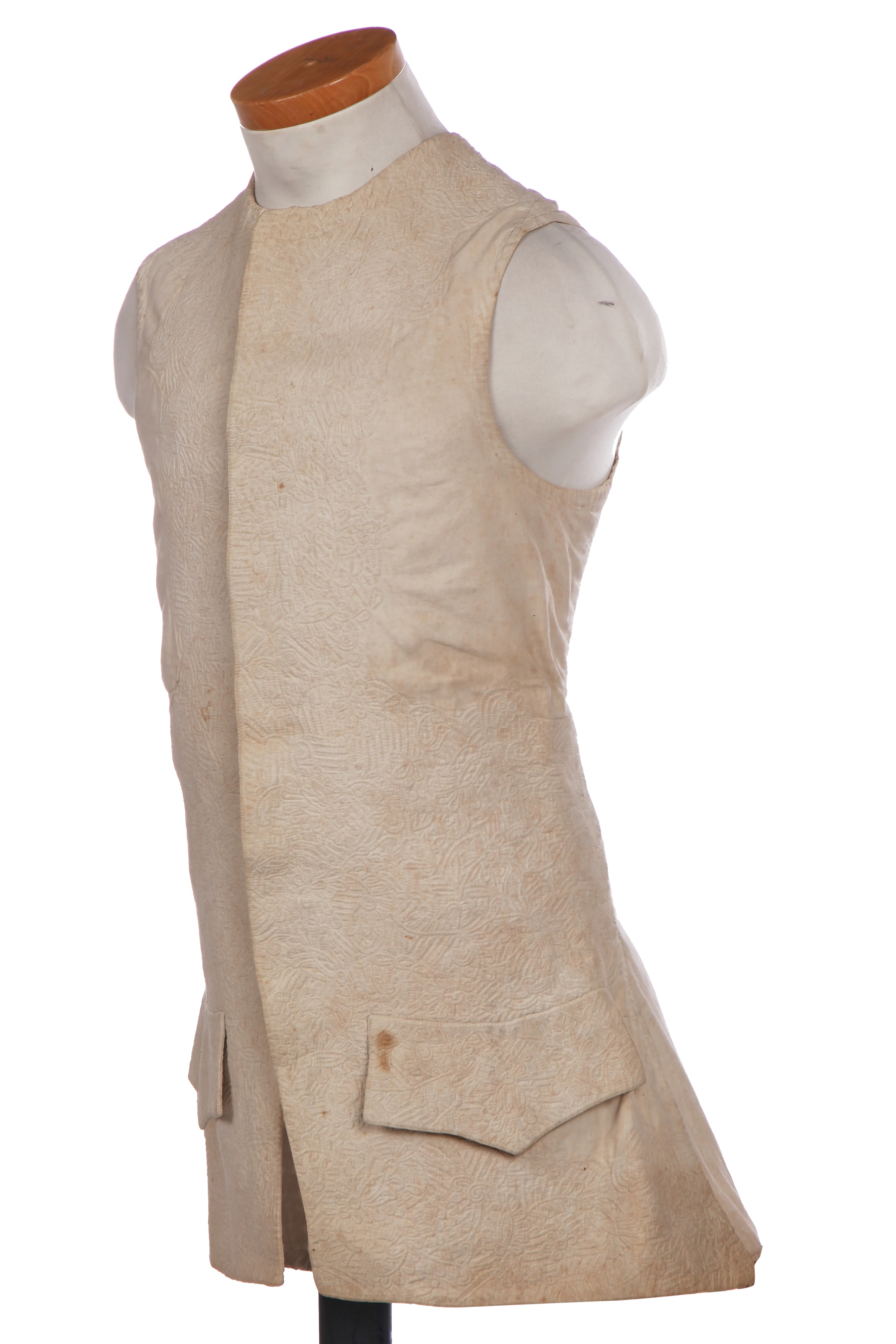 Lot 213 - A gentleman's quilted linen waistcoat, 1730s,