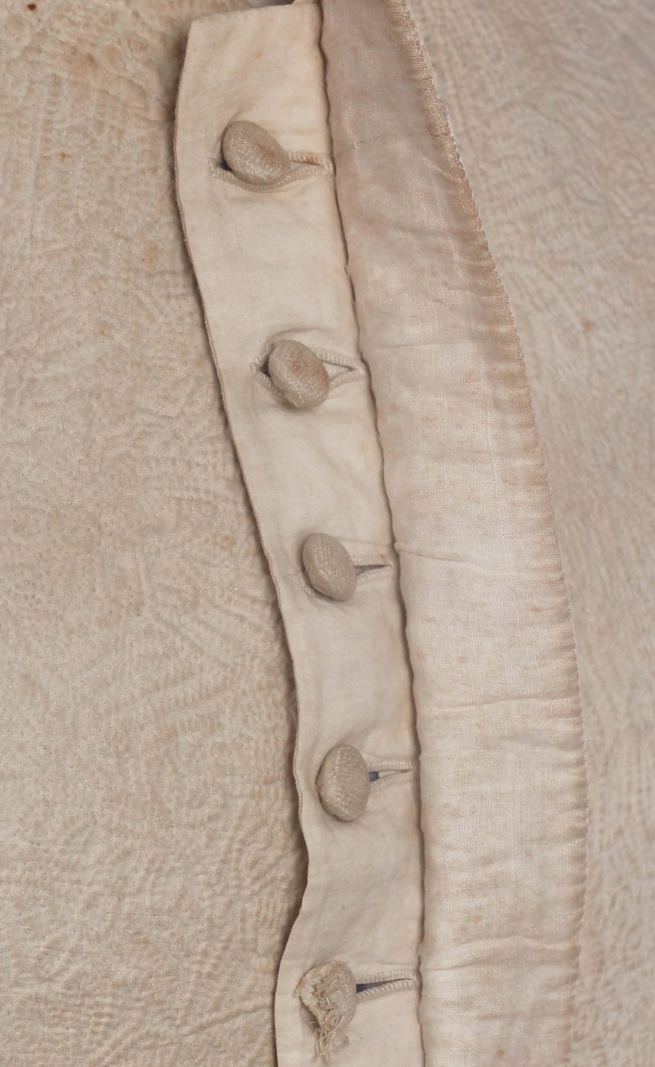 Lot 213 - A gentleman's quilted linen waistcoat, 1730s,