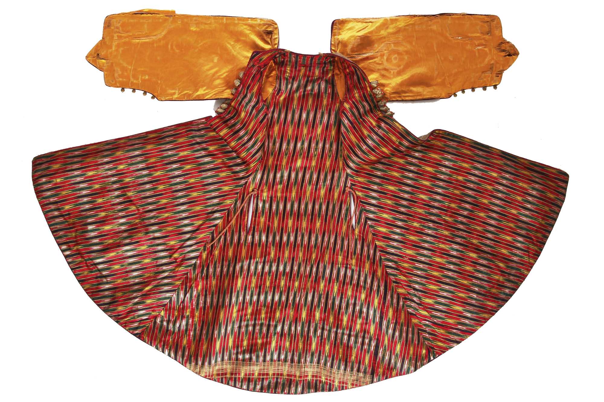 Lot 500 - An embroidered burgundy velvet surcoat,