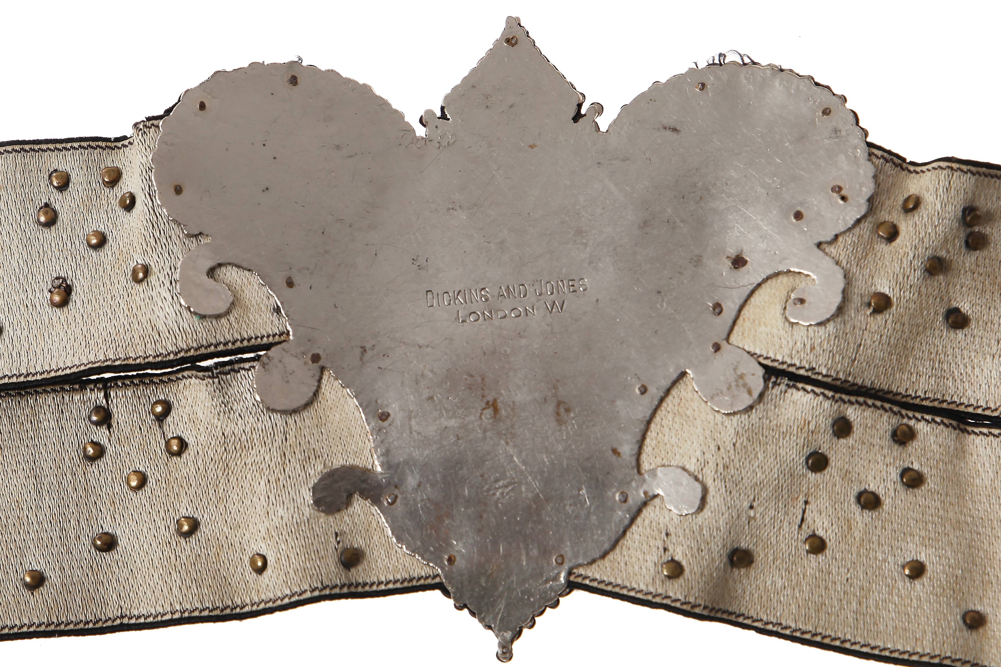 Lot 446 - A group of belts and buckles, 1900-1930s,