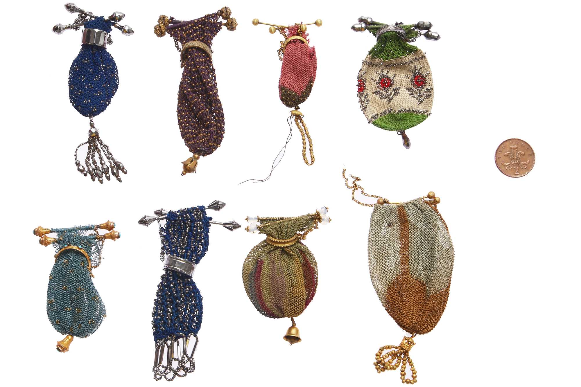 Lot 67 - A good group of reticules, sovereign and