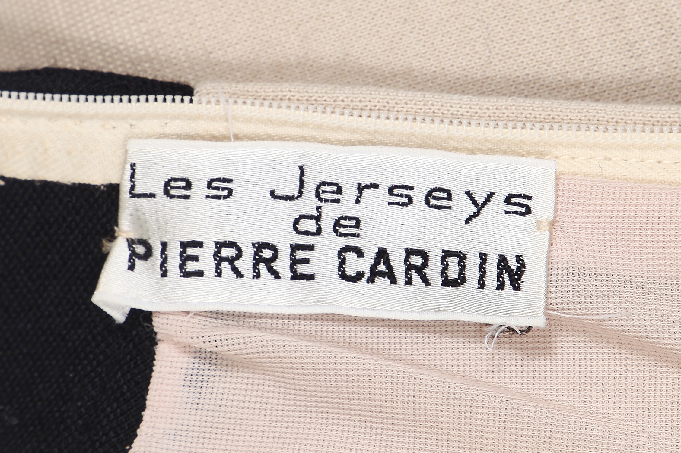 Lot 370 - A Pierre Cardin ecru wool jersey minidress,
