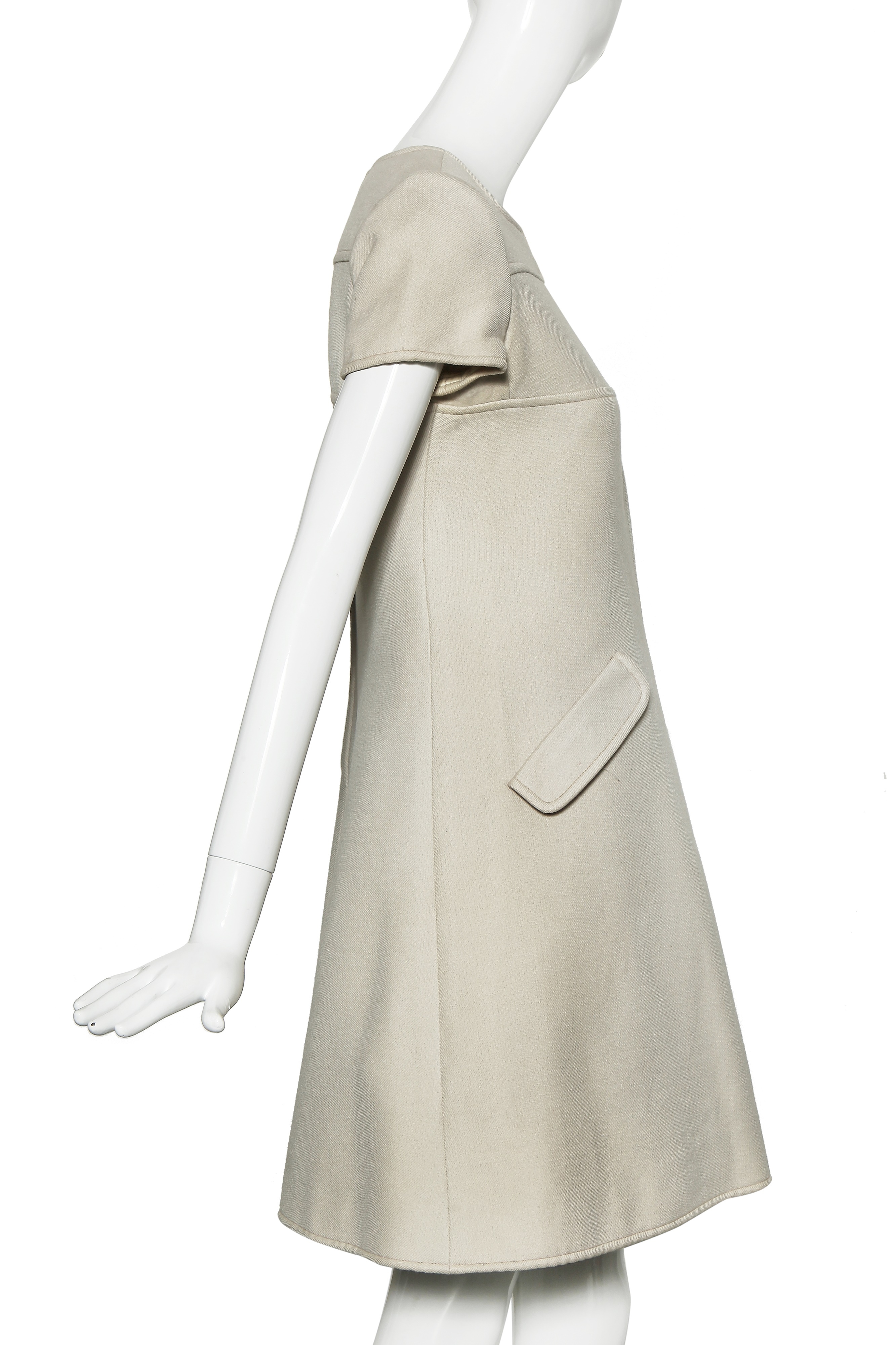 Lot 143 - An André Courrèges dove-grey wool dress,