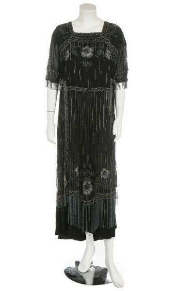 Lot 173 - A beaded tulle tabard, circa 1919,