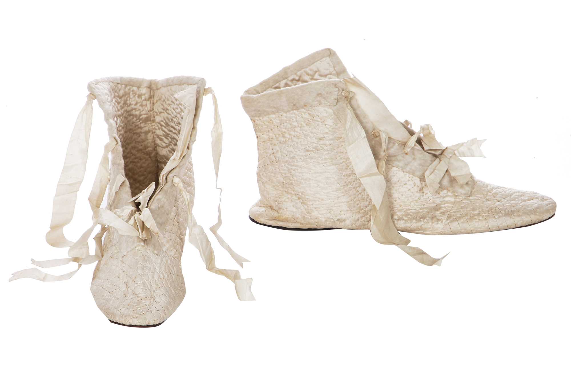 Lot 502 - A pair of quilted silk carriage boots, mid