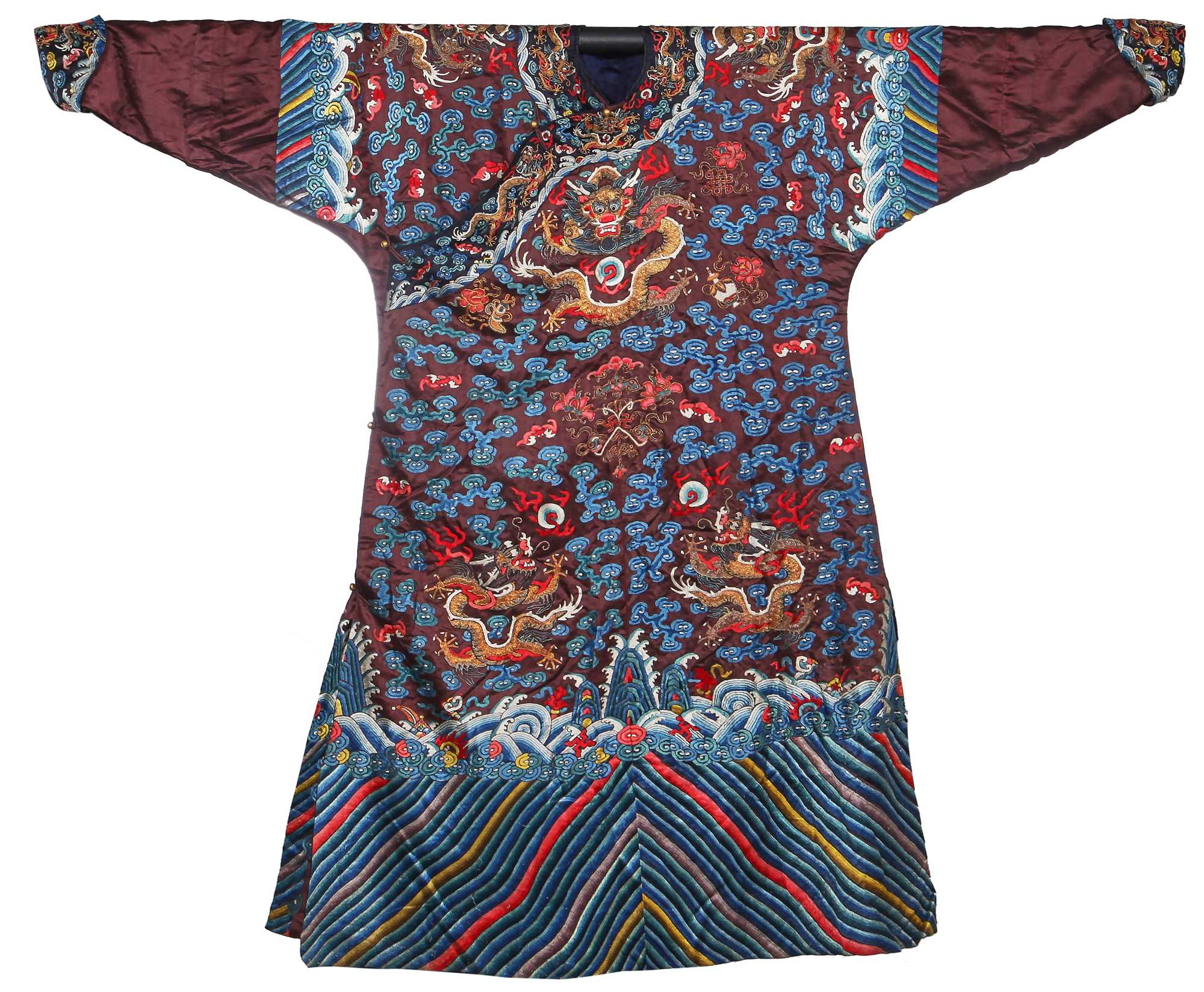 Lot 427 - A woman's embroidered brown silk ground