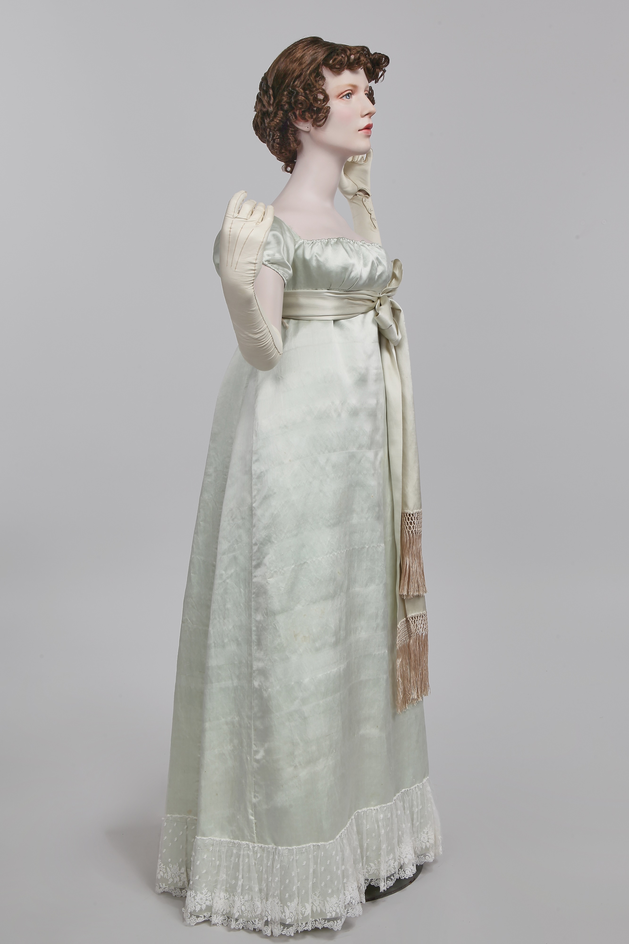 Lot 62 - An eau de Nil satin evening dress, probably