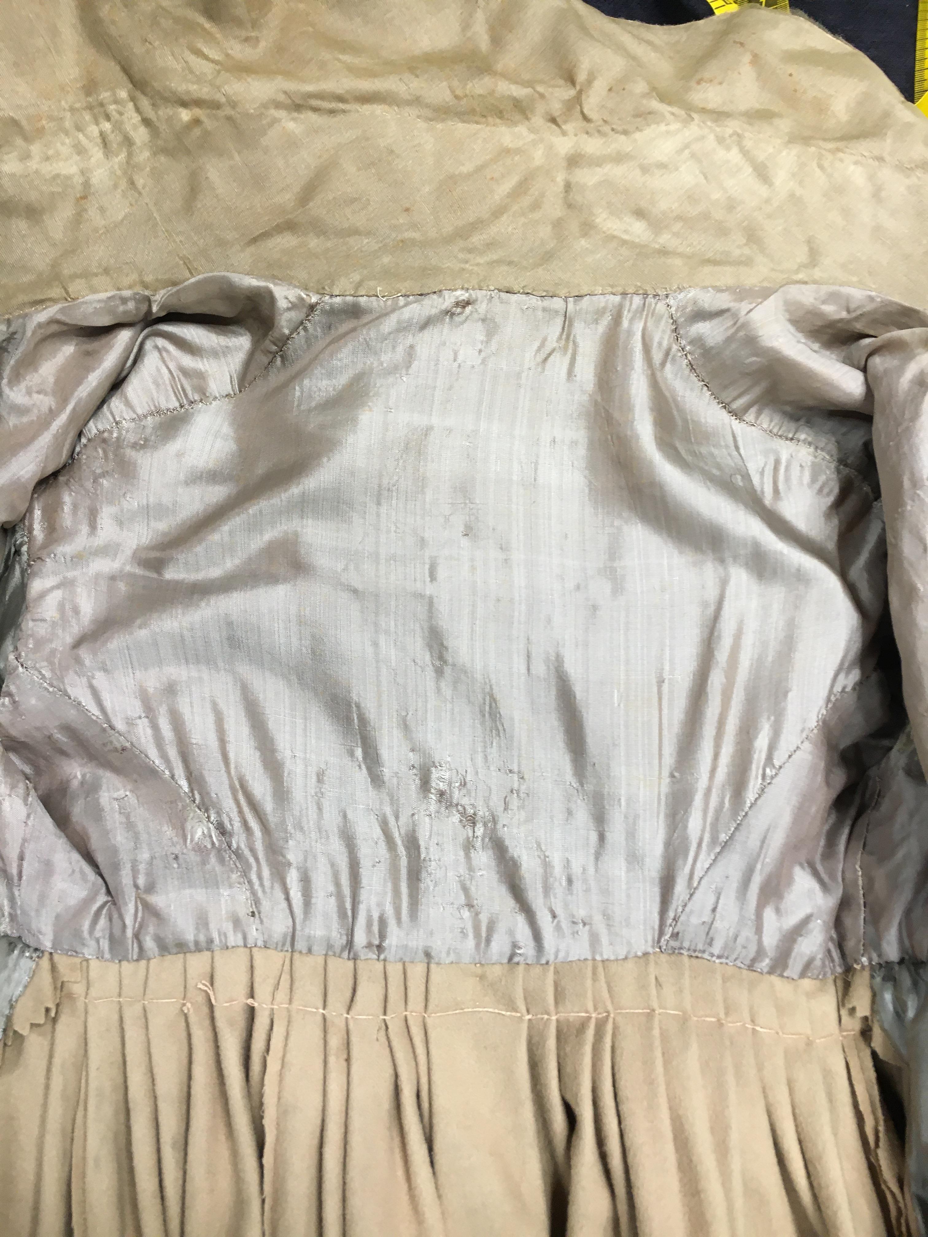 Lot 116 - A fine wool redingote with faux fur (silk