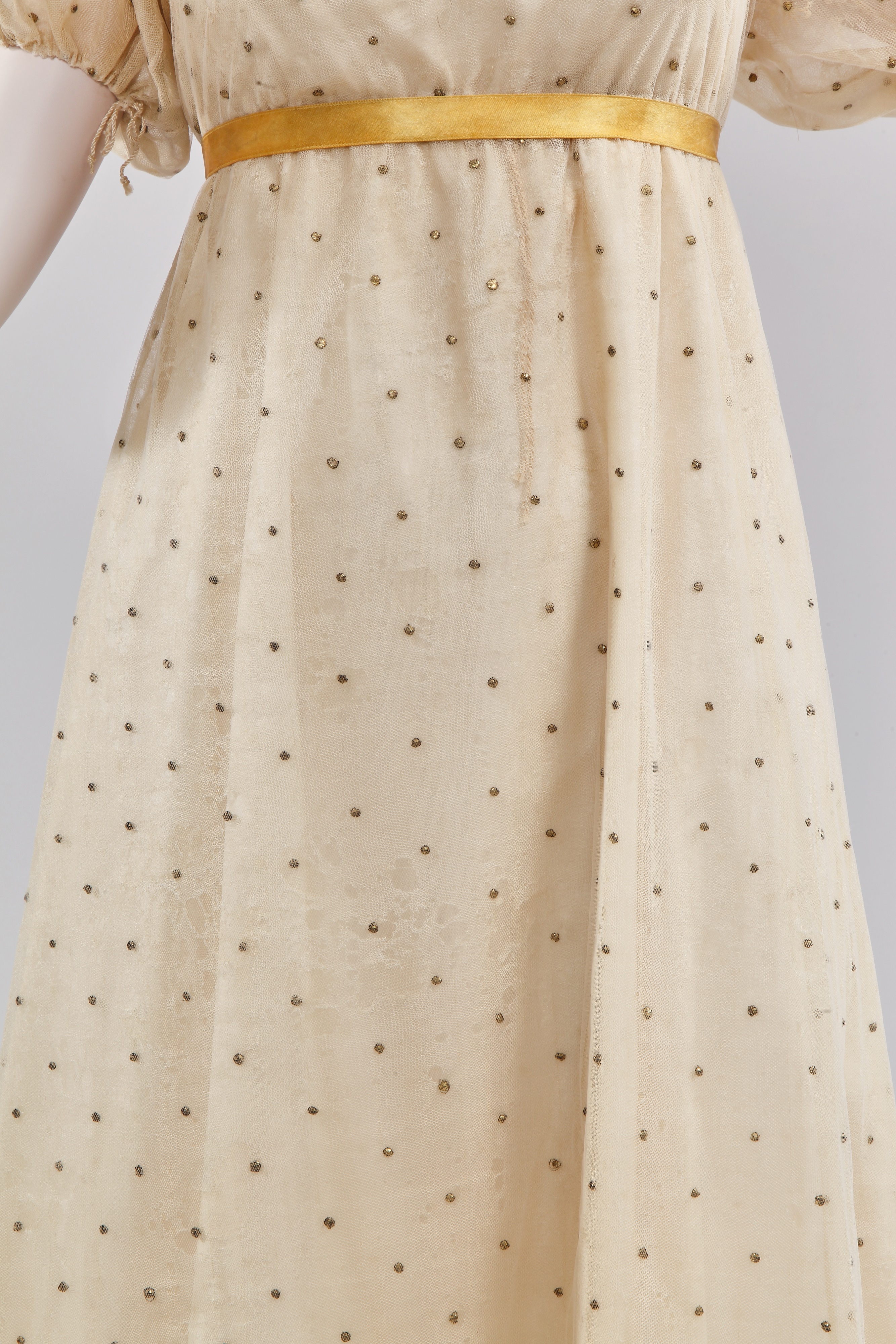 Lot 49 - A gold embroidered silk tulle dance dress,