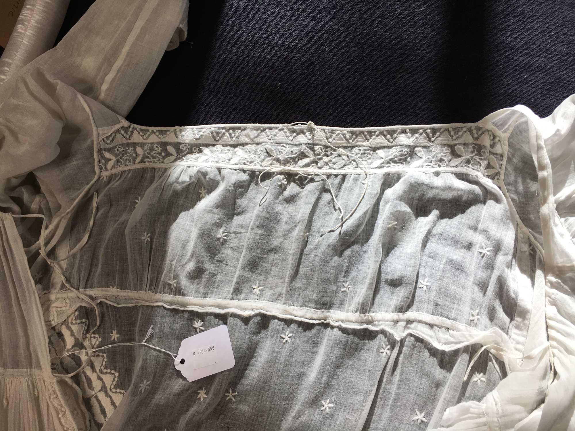 Lot 48 - A whitework embroidered muslin dress, French,