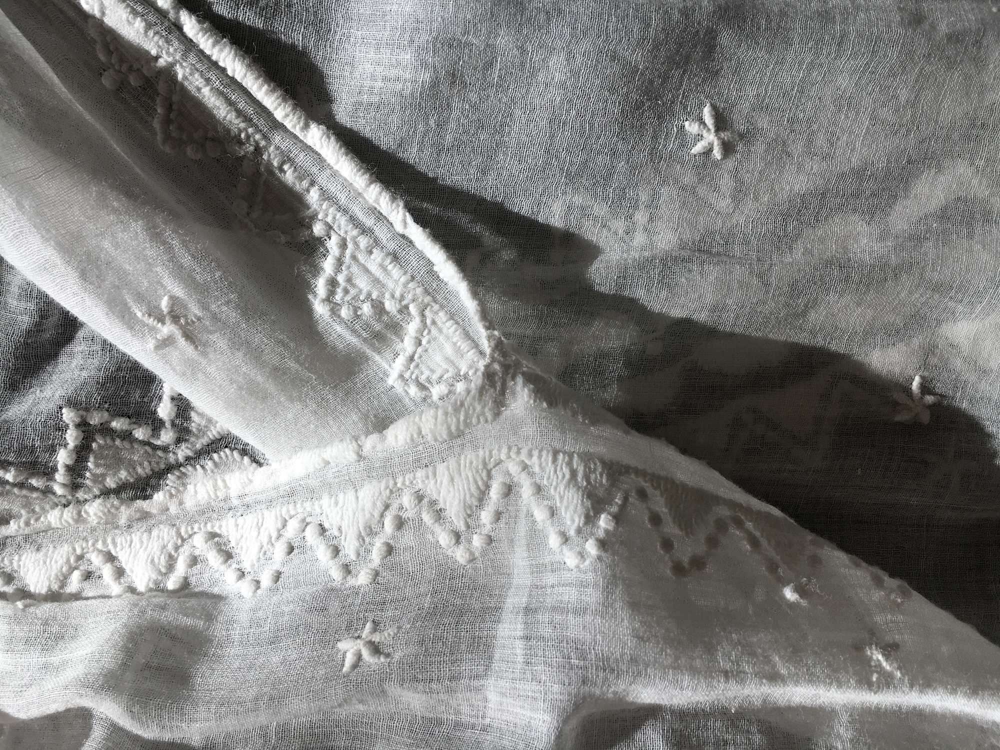 Lot 48 - A whitework embroidered muslin dress, French,