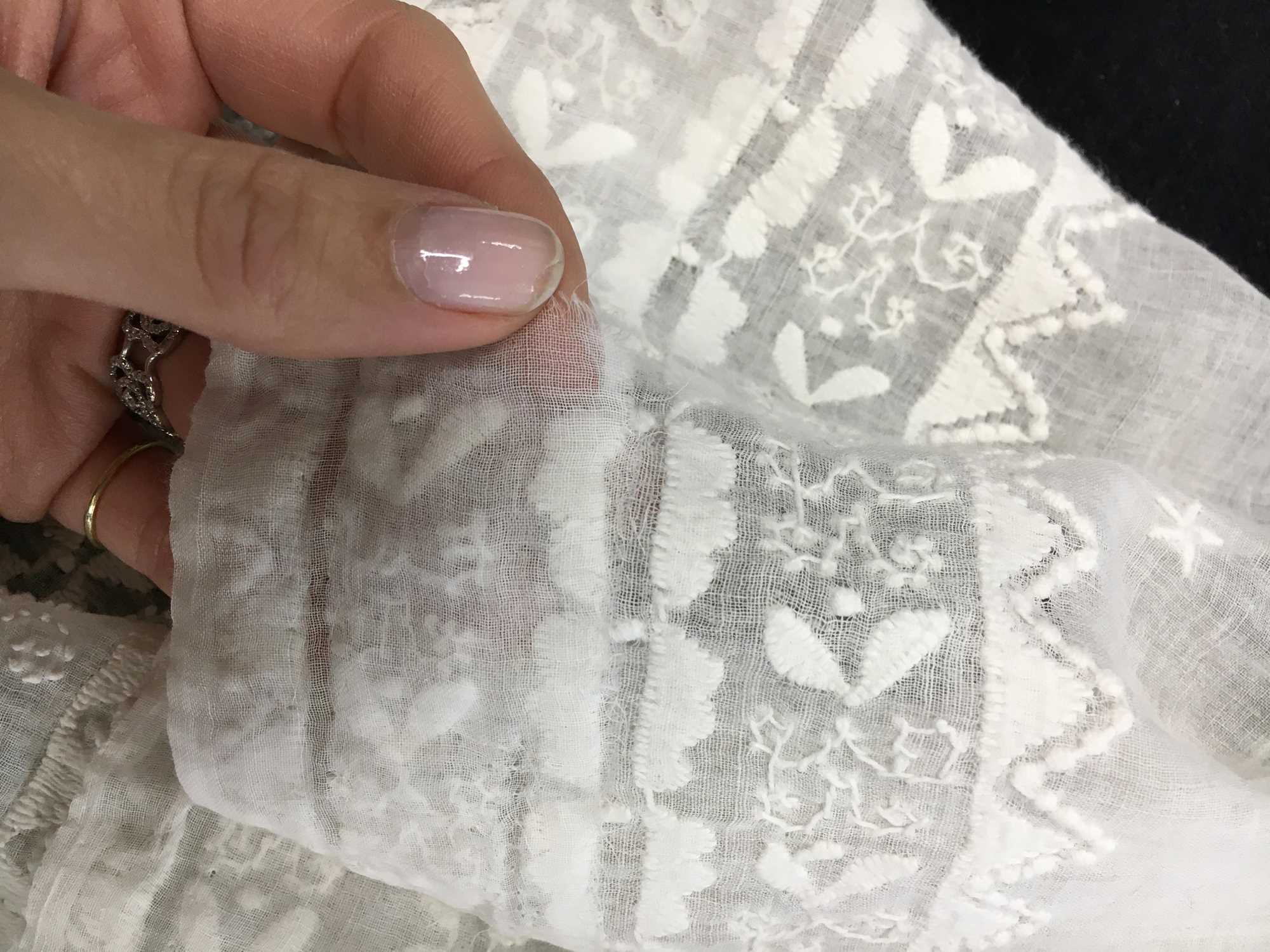 Lot 48 - A whitework embroidered muslin dress, French,