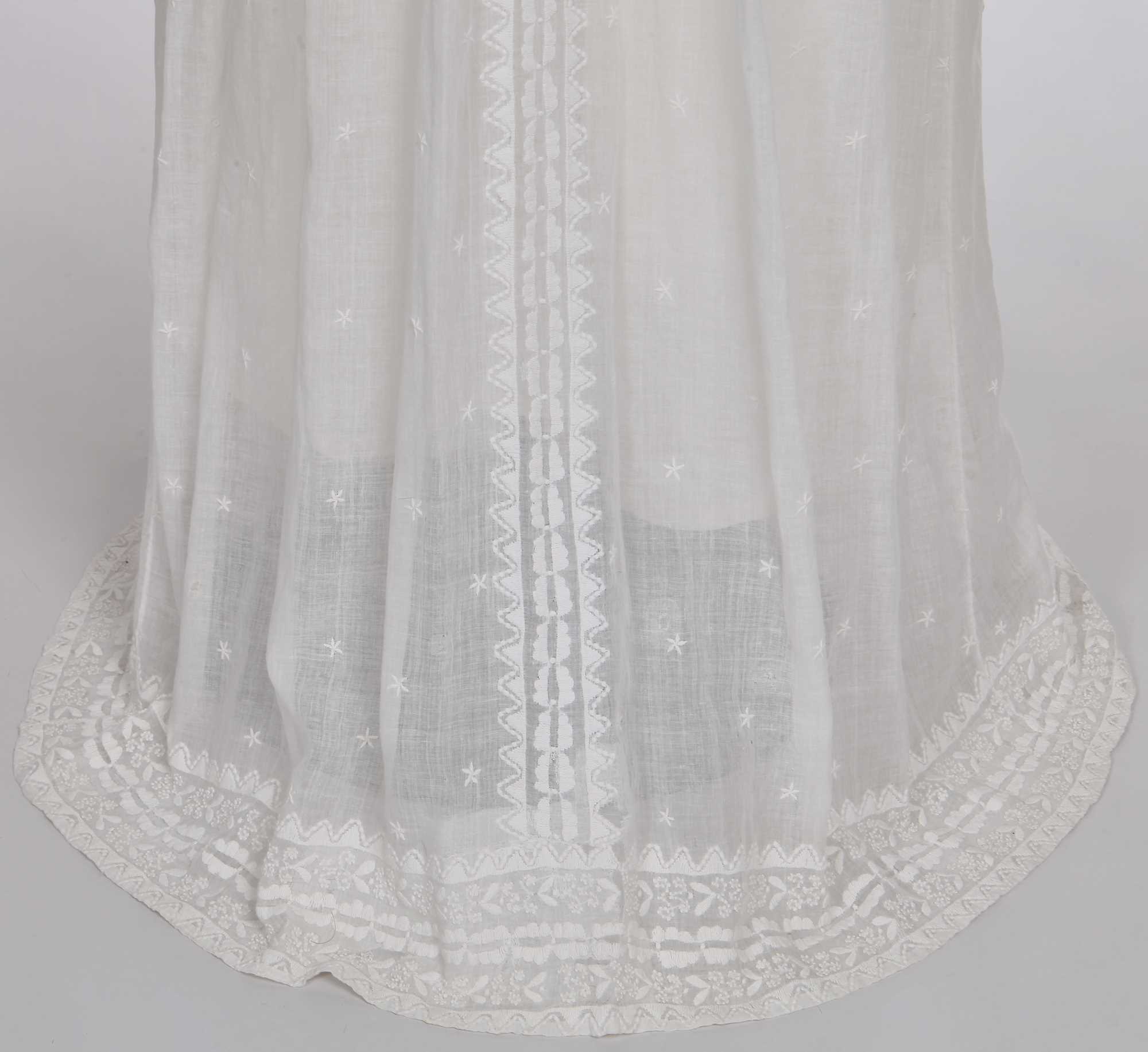 Lot 48 - A whitework embroidered muslin dress, French,