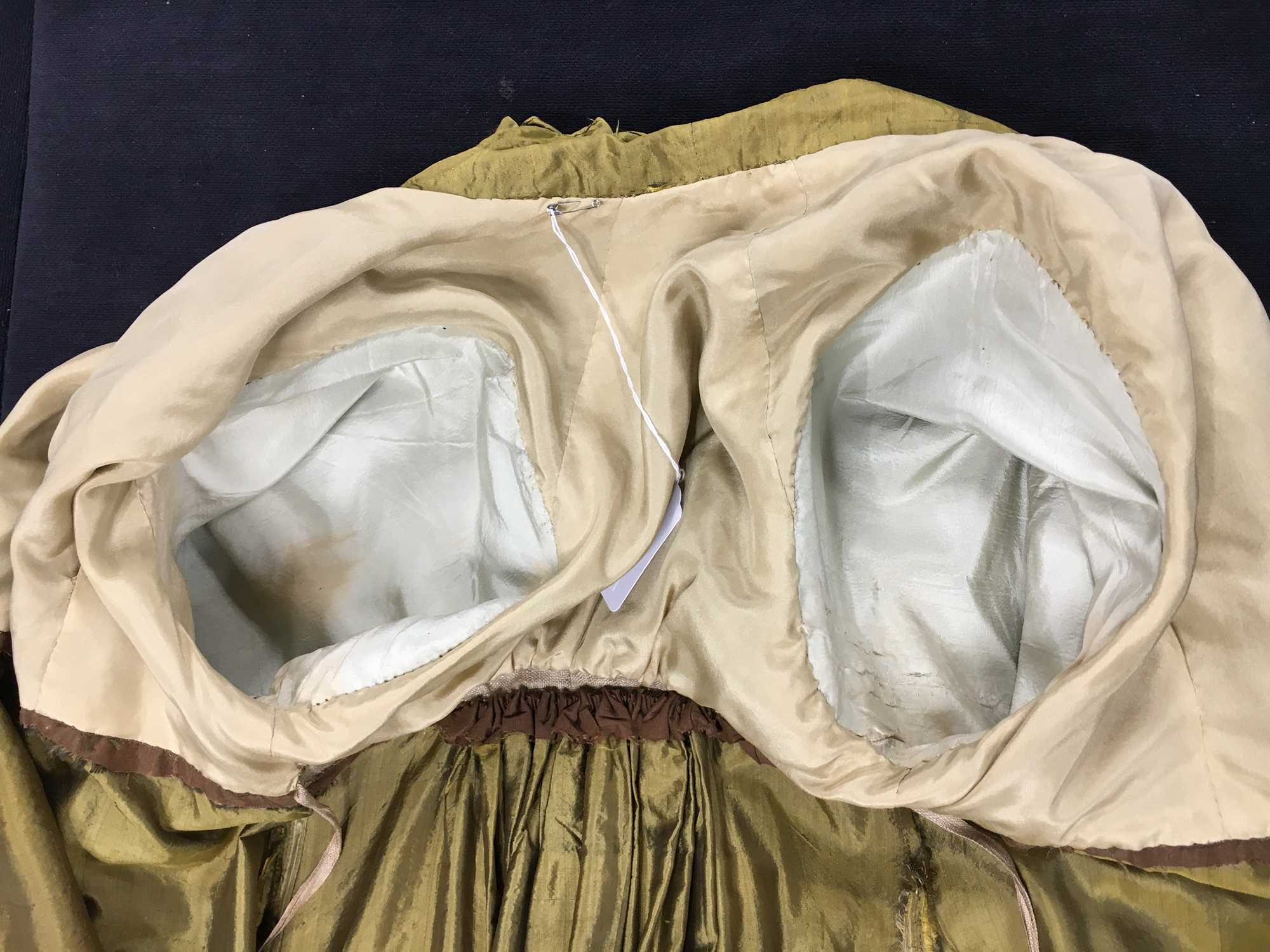 Lot 90 - A brown-green sarsanet redingote/pelisse,