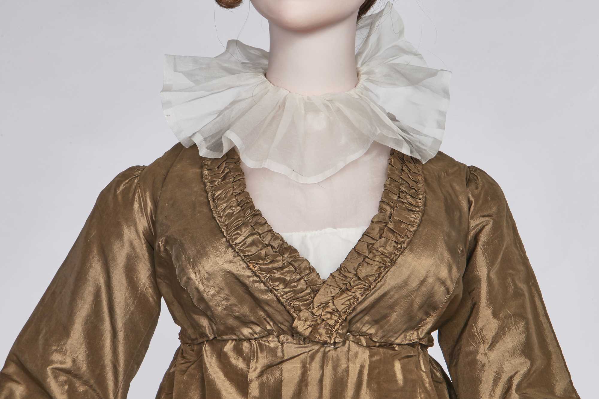 Lot 82 - A green-brown shot silk taffeta dress, French,