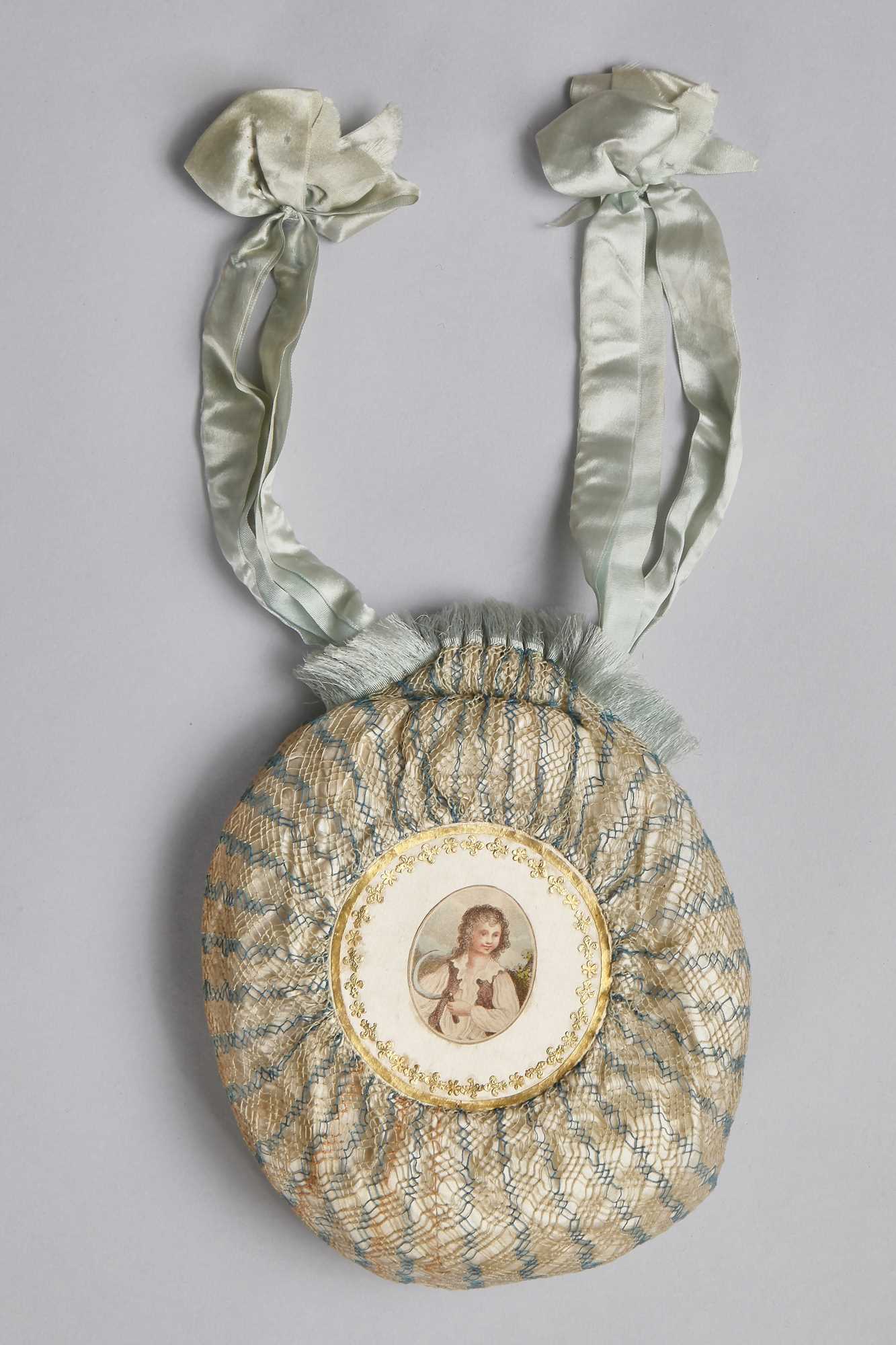 Lot 9 - A blue and ivory silk net purse with printed