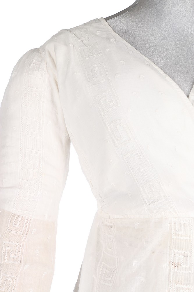 Lot 401 - An embroidered sprigged muslin dress,