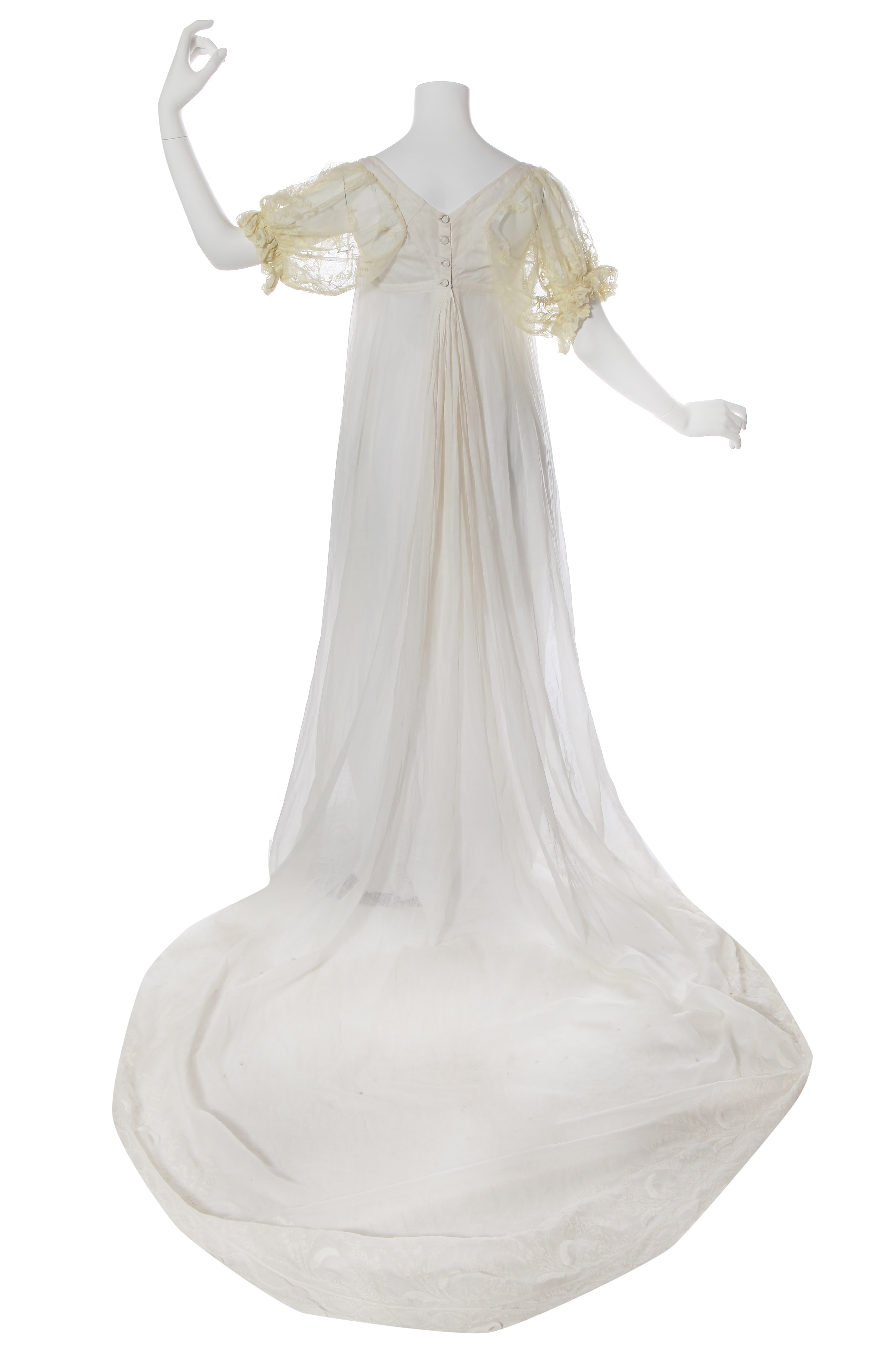 Lot 512 - An embroidered muslin frock with train,