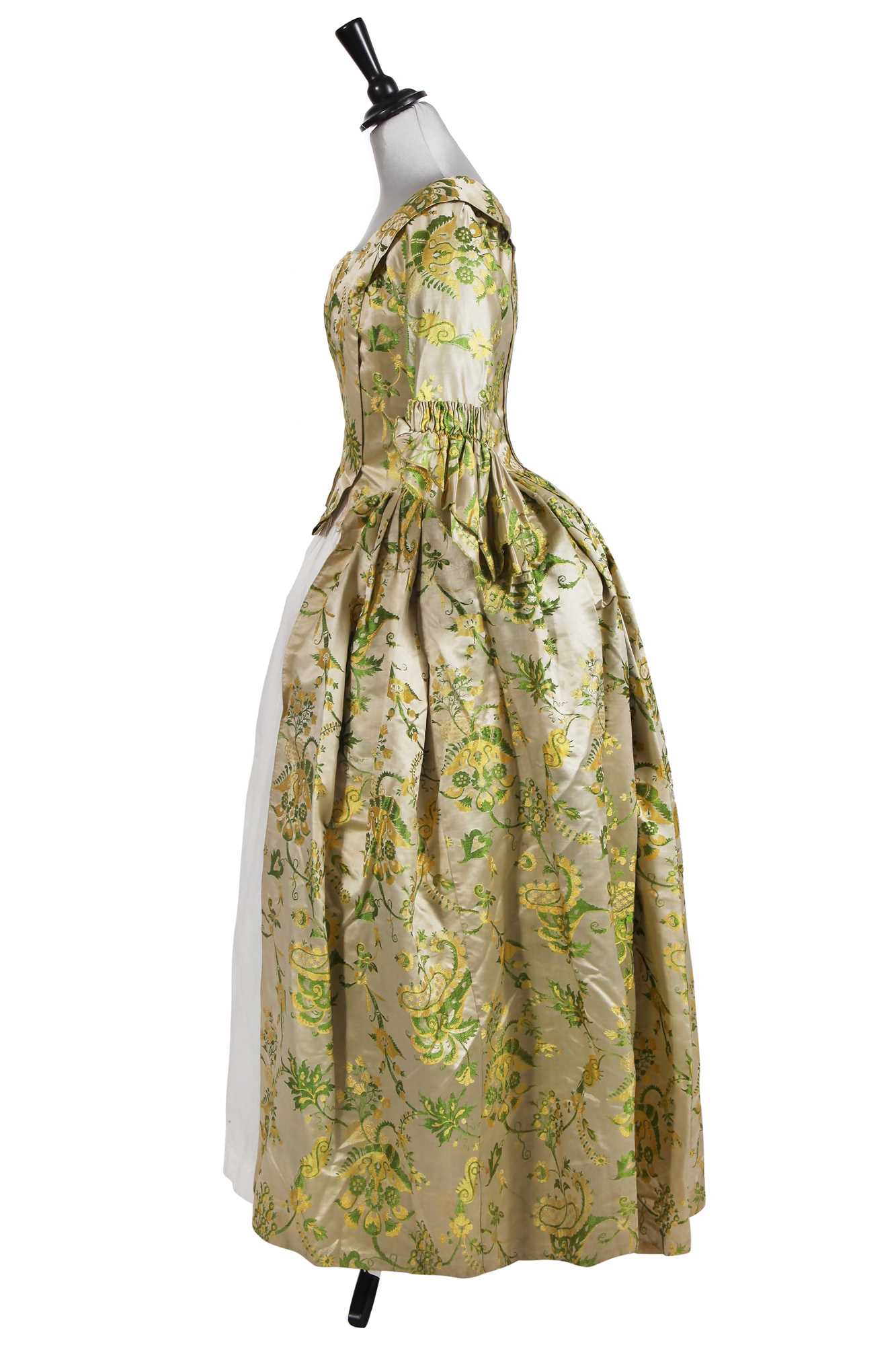 Lot 533 - A fitted gown, of bizarre brocaded satin