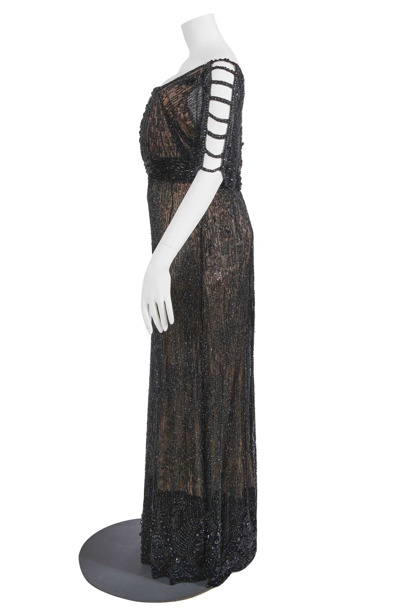 Lot 468 - A fine Paul Poiret beaded evening dress,