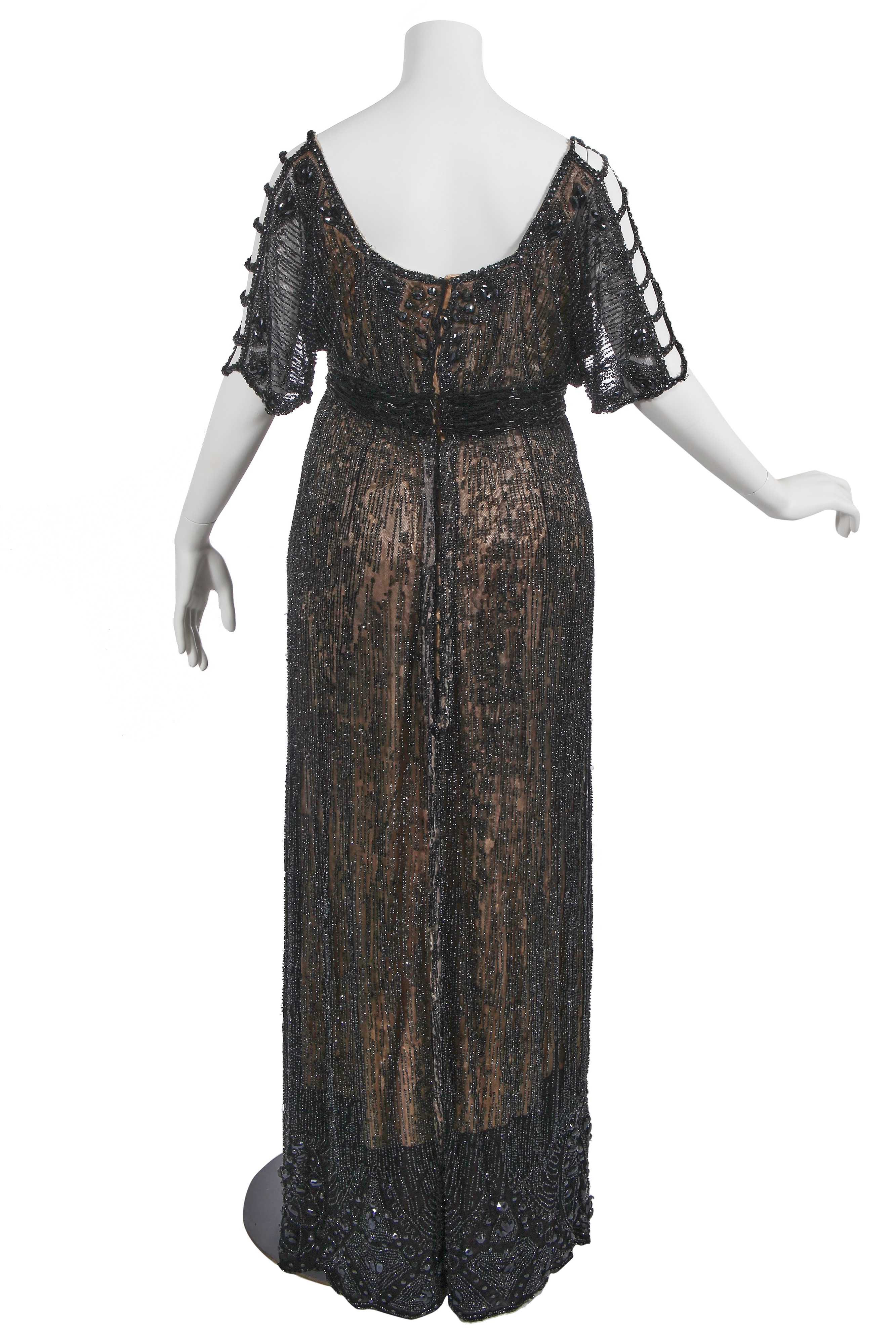 Lot 468 - A fine Paul Poiret beaded evening dress,