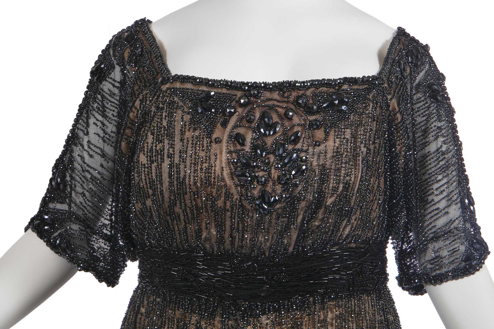 Lot 468 - A fine Paul Poiret beaded evening dress,
