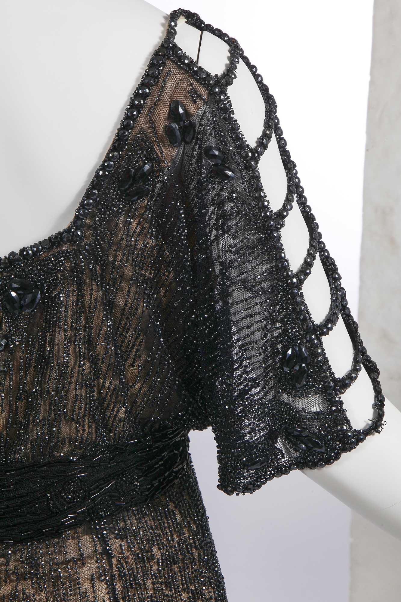 Lot 468 - A fine Paul Poiret beaded evening dress,