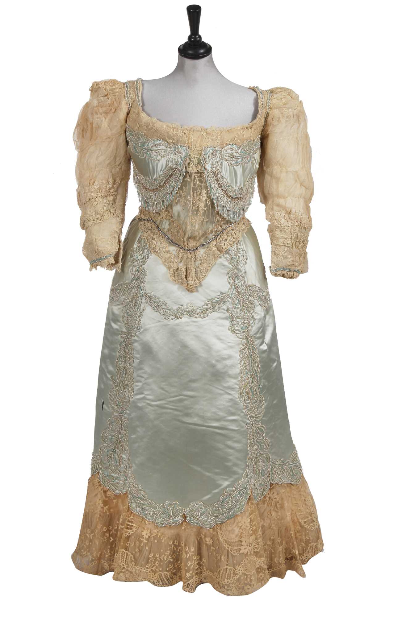 Lot 484 - A Charles Frederick Worth eau de nil satin