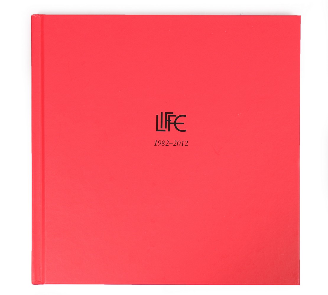 Lot 77 - A LIFFE blue and red cotton trading jacket,