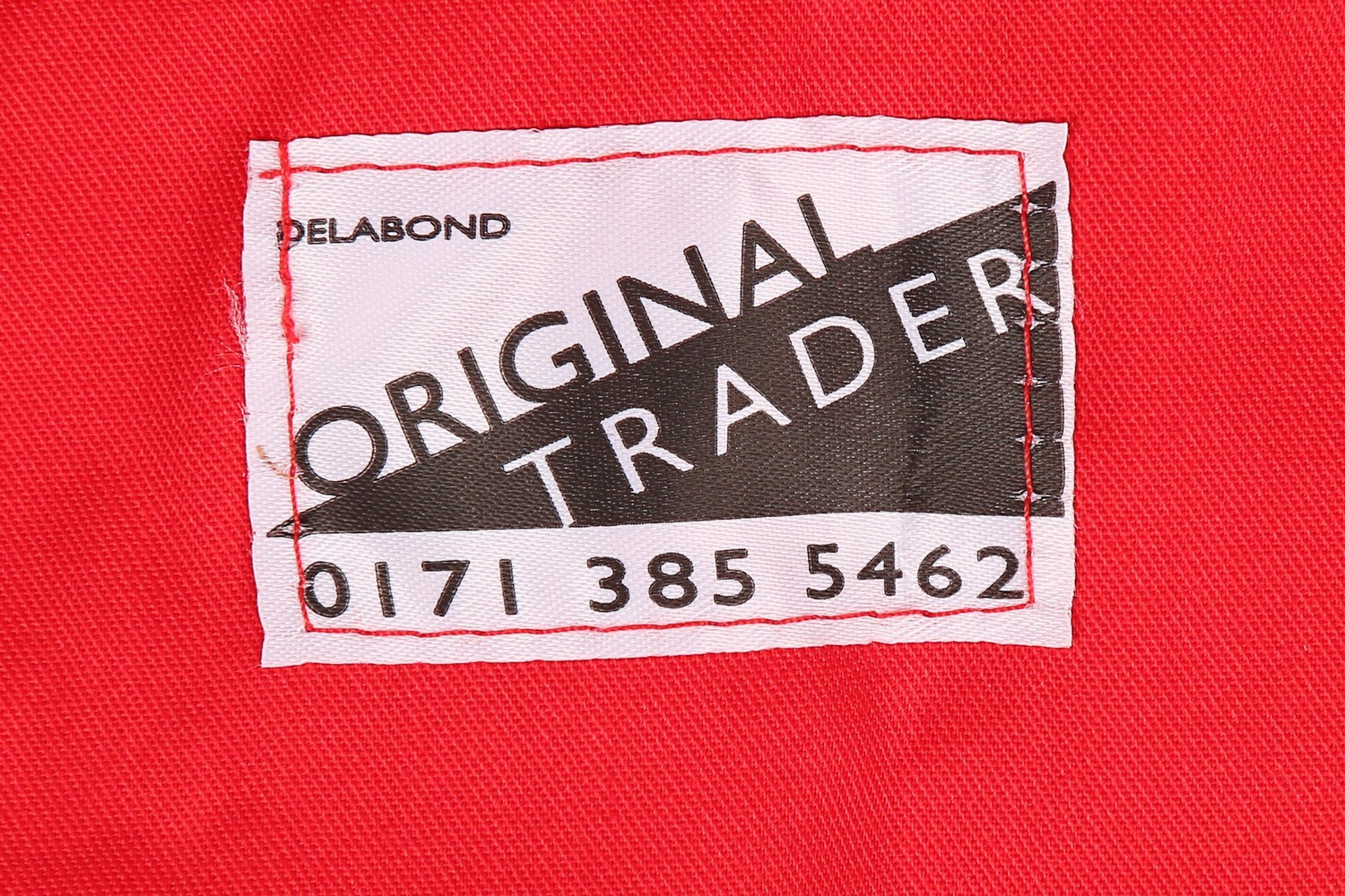 Lot 77 - A LIFFE blue and red cotton trading jacket,