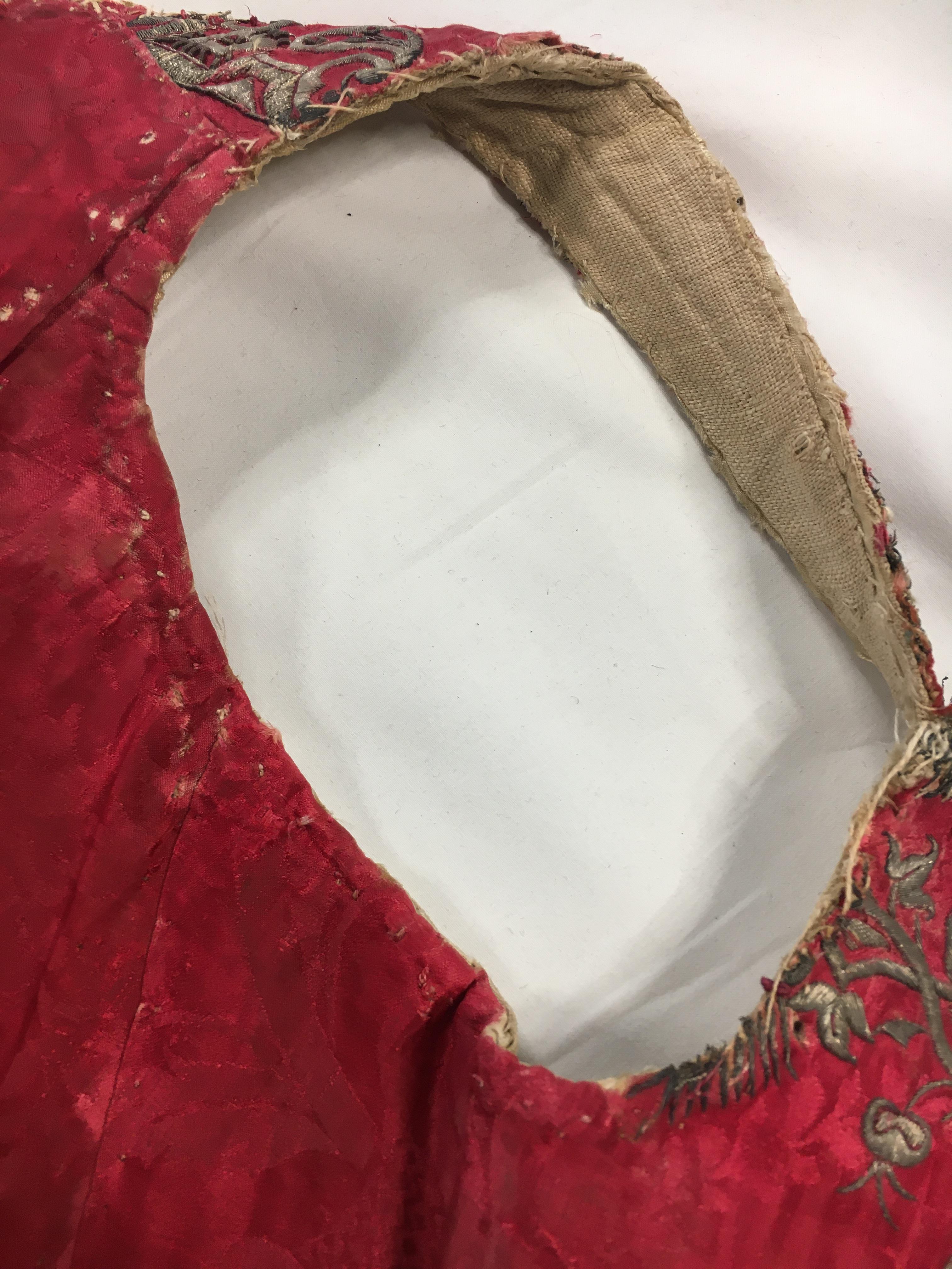 Lot 537 - A pair of scarlet damask smooth covered