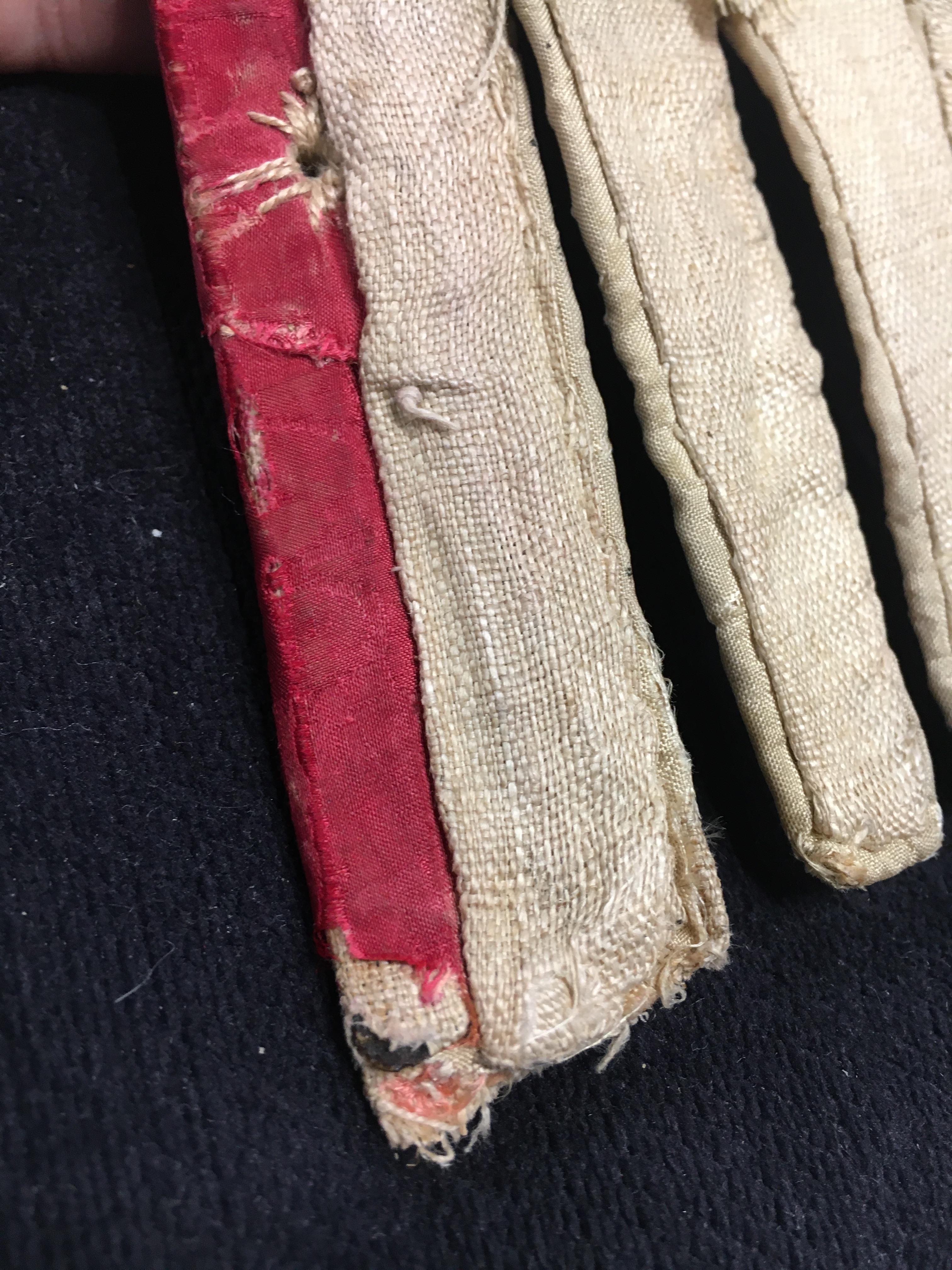 Lot 537 - A pair of scarlet damask smooth covered