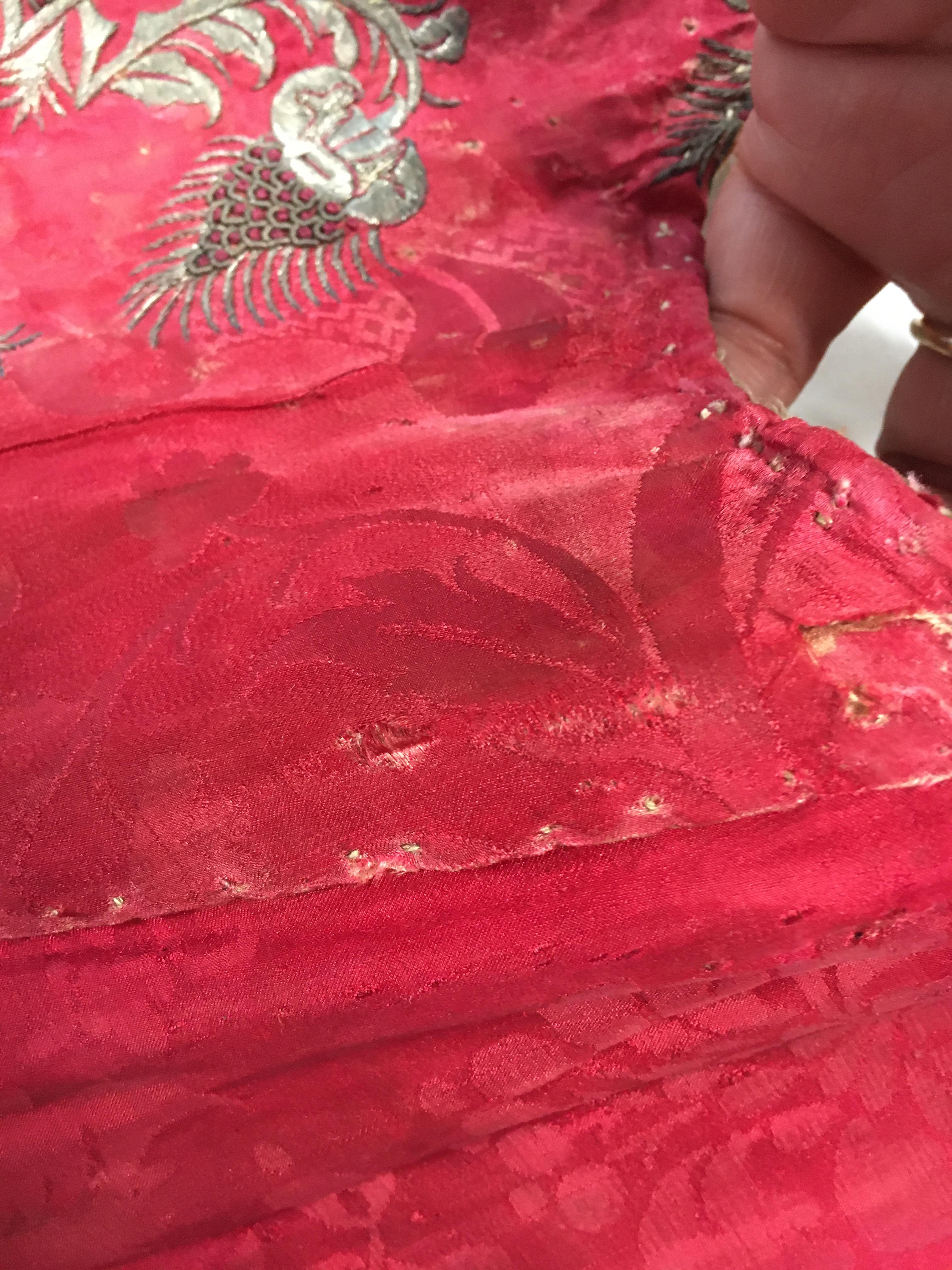 Lot 537 - A pair of scarlet damask smooth covered