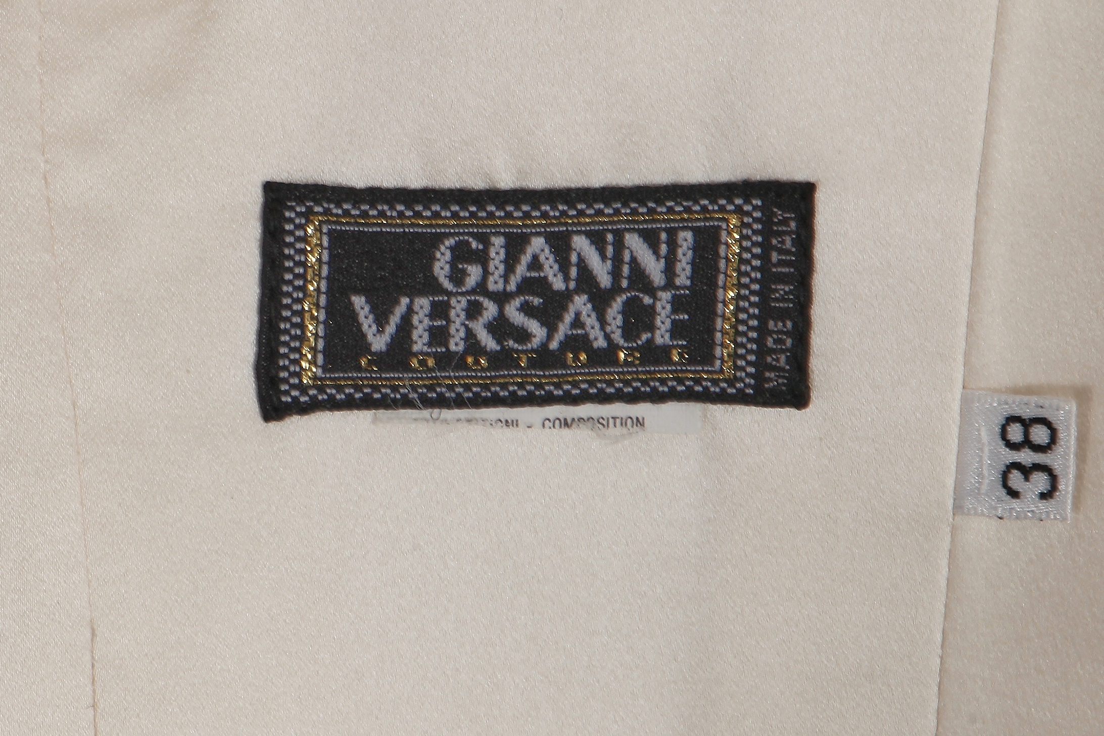 Lot 271 - A Gianni Versace cream lamé dress, circa