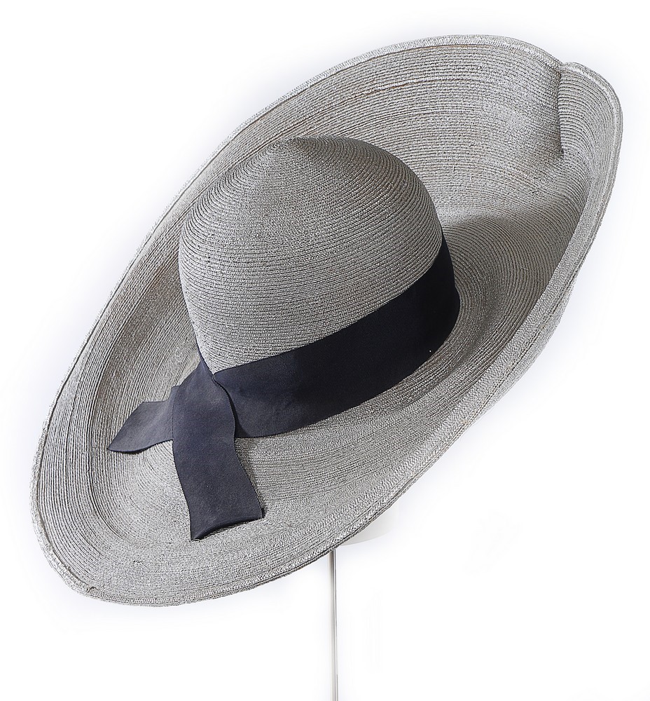 Lot 68 - A Philip Treacy wide-brimmed silver straw hat,