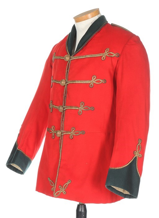 Lot 136 - A gentleman's military-style smoking jacket,